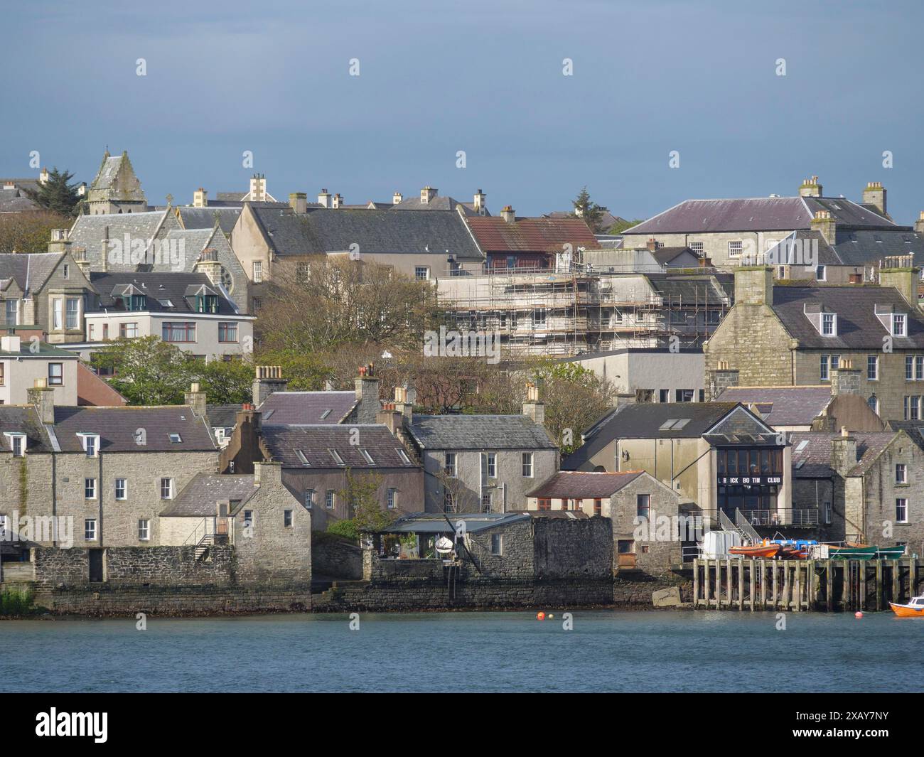Traditional town view with houses and buildings on the waterfront ...