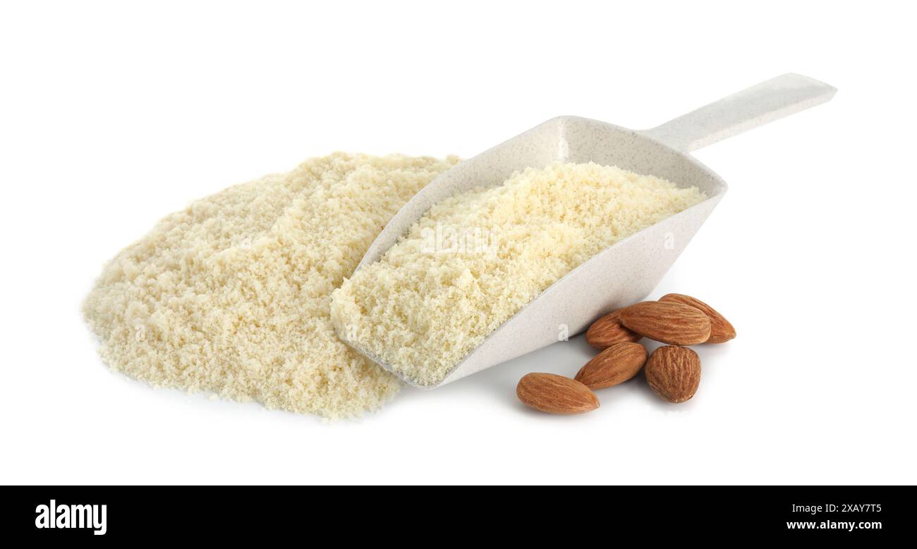 Pile of fresh almond flour, nuts and scoop isolated on white Stock ...