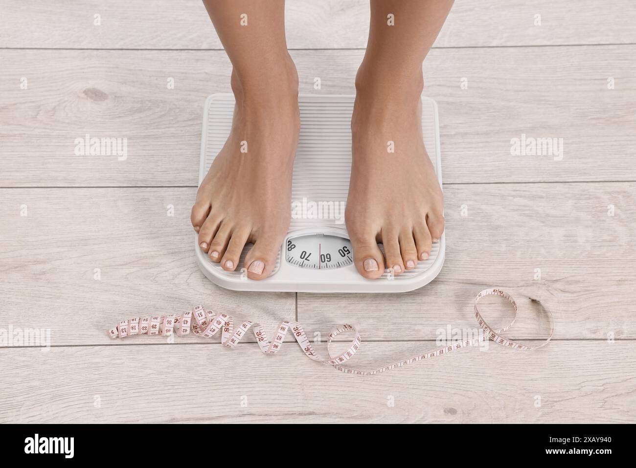 Woman measuring body mass hi-res stock photography and images - Alamy