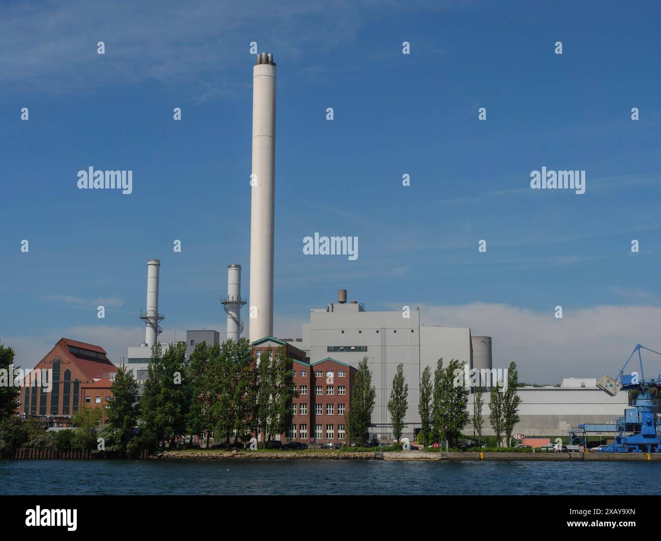 Industrial plant with chimneys and red brick buildings on the ...