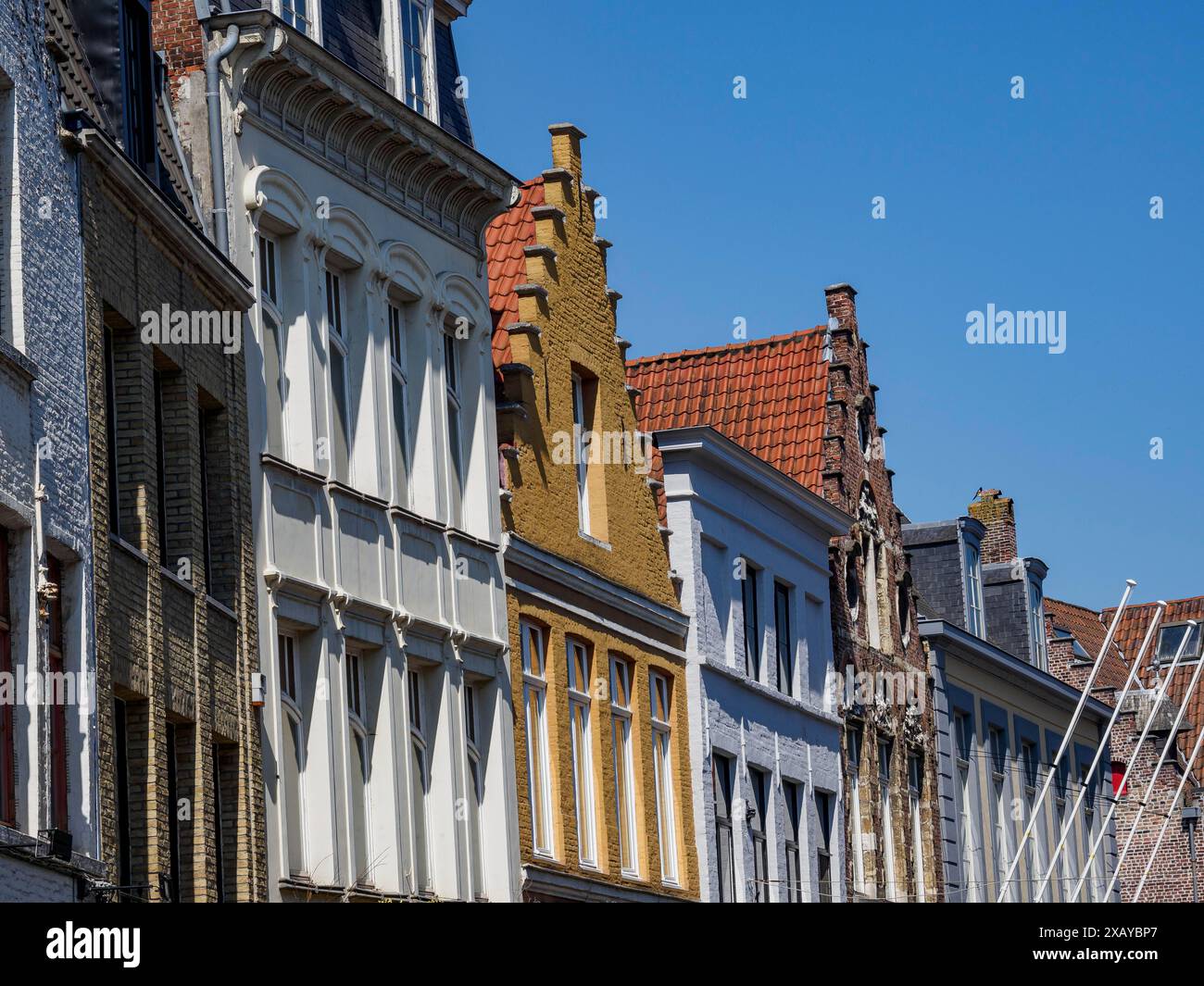 Rows of historic buildings with gables and different facade styles ...