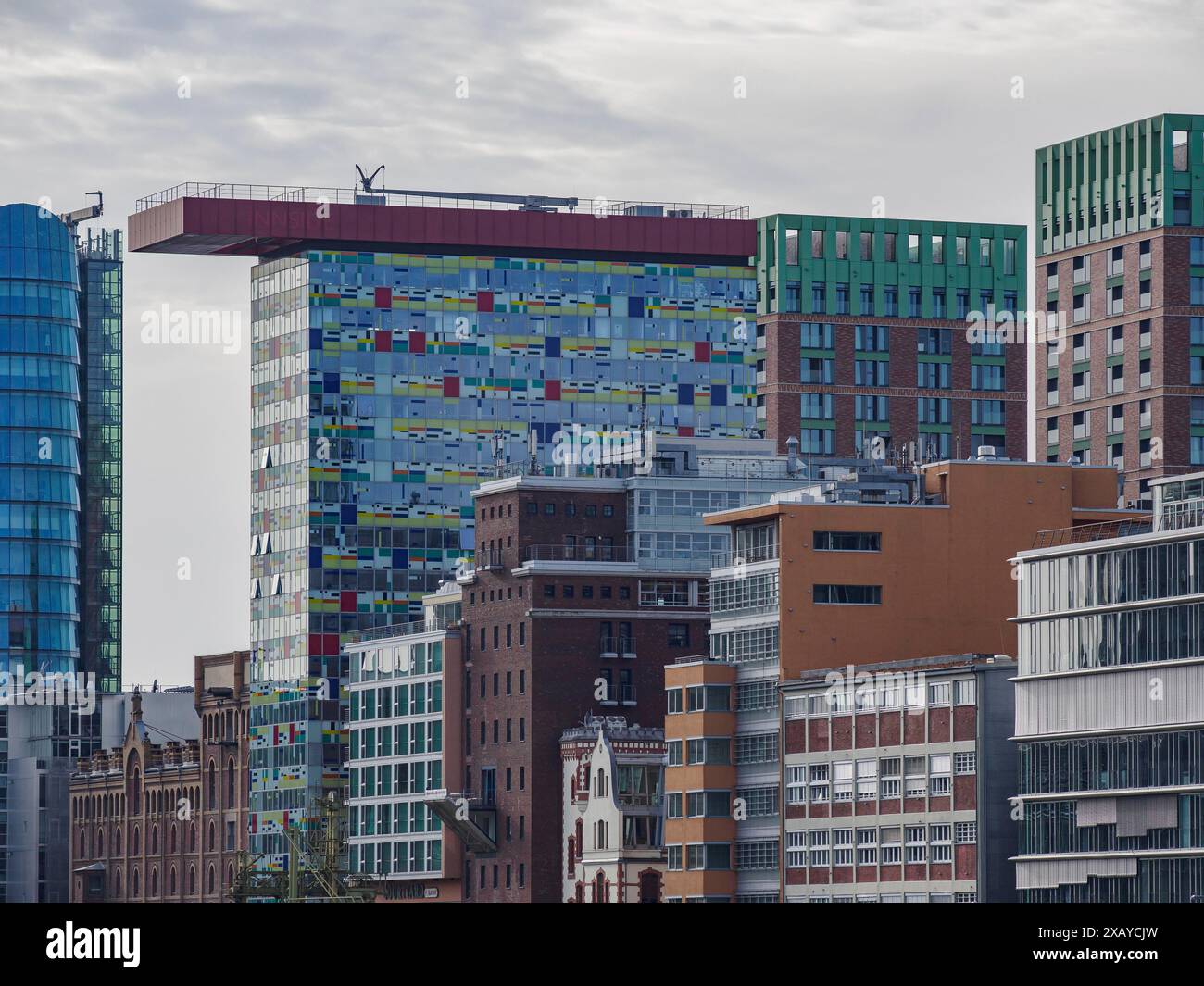 High-rise buildings with colourful facades dominate the urban skyline ...