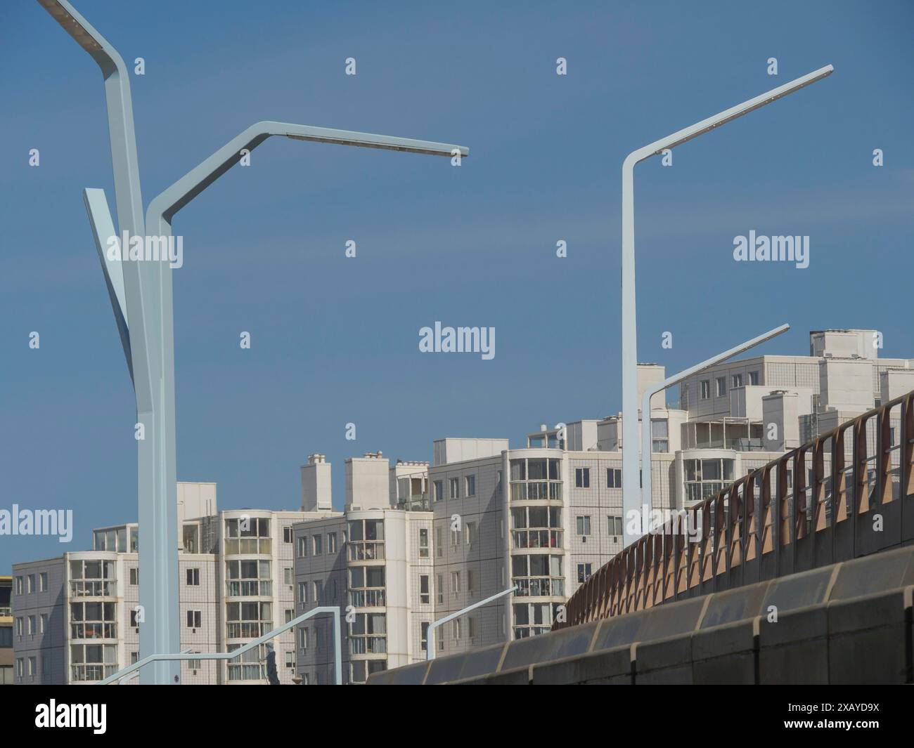 Modern architecture with steps and railings in front of high-rise ...