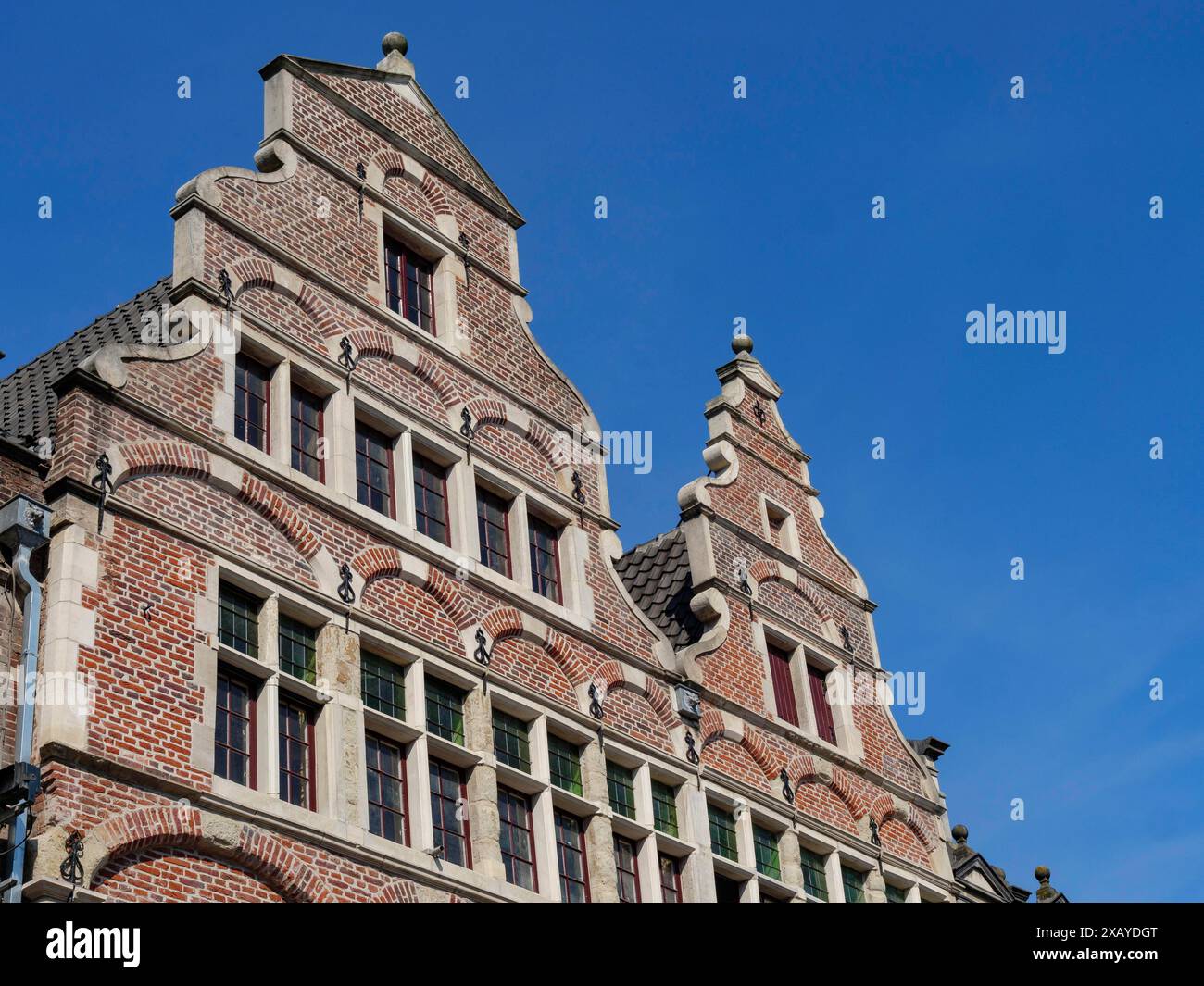 Historic building with striking brick facade and many windows under a ...