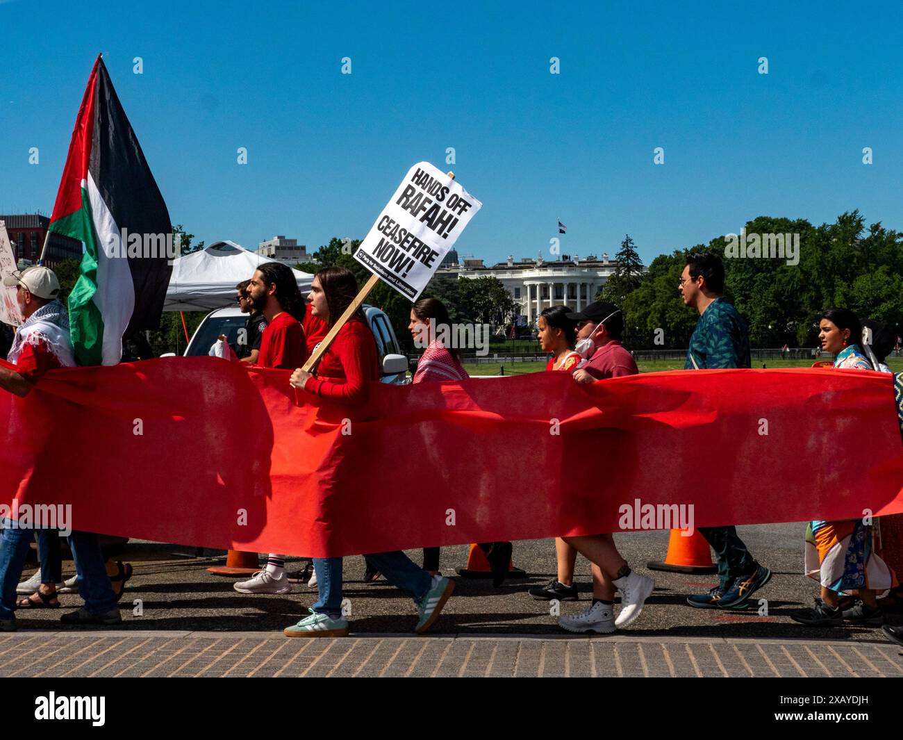 Washington, District Of Columbia, USA. 8th June, 2024. Protestors carry ...