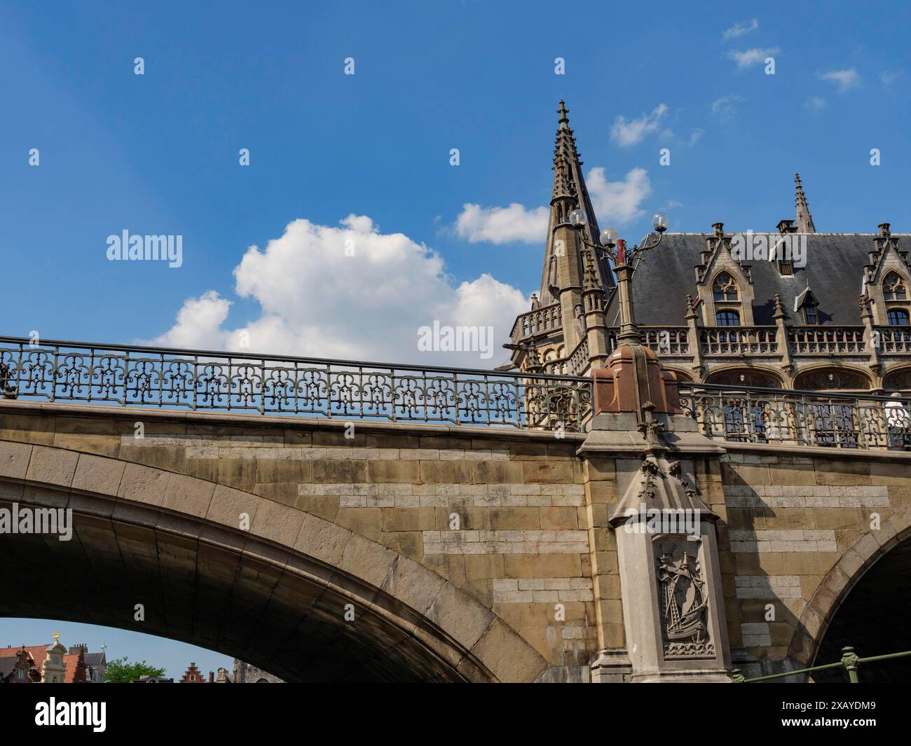 Old stone bridge with ornate railings and Gothic elements under a ...