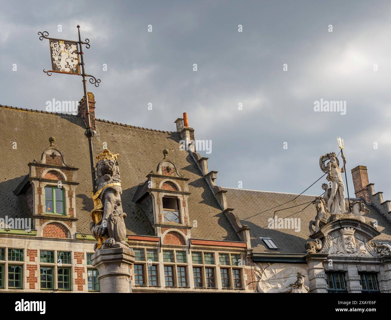 Historic town square with impressive architecture and statues under a ...