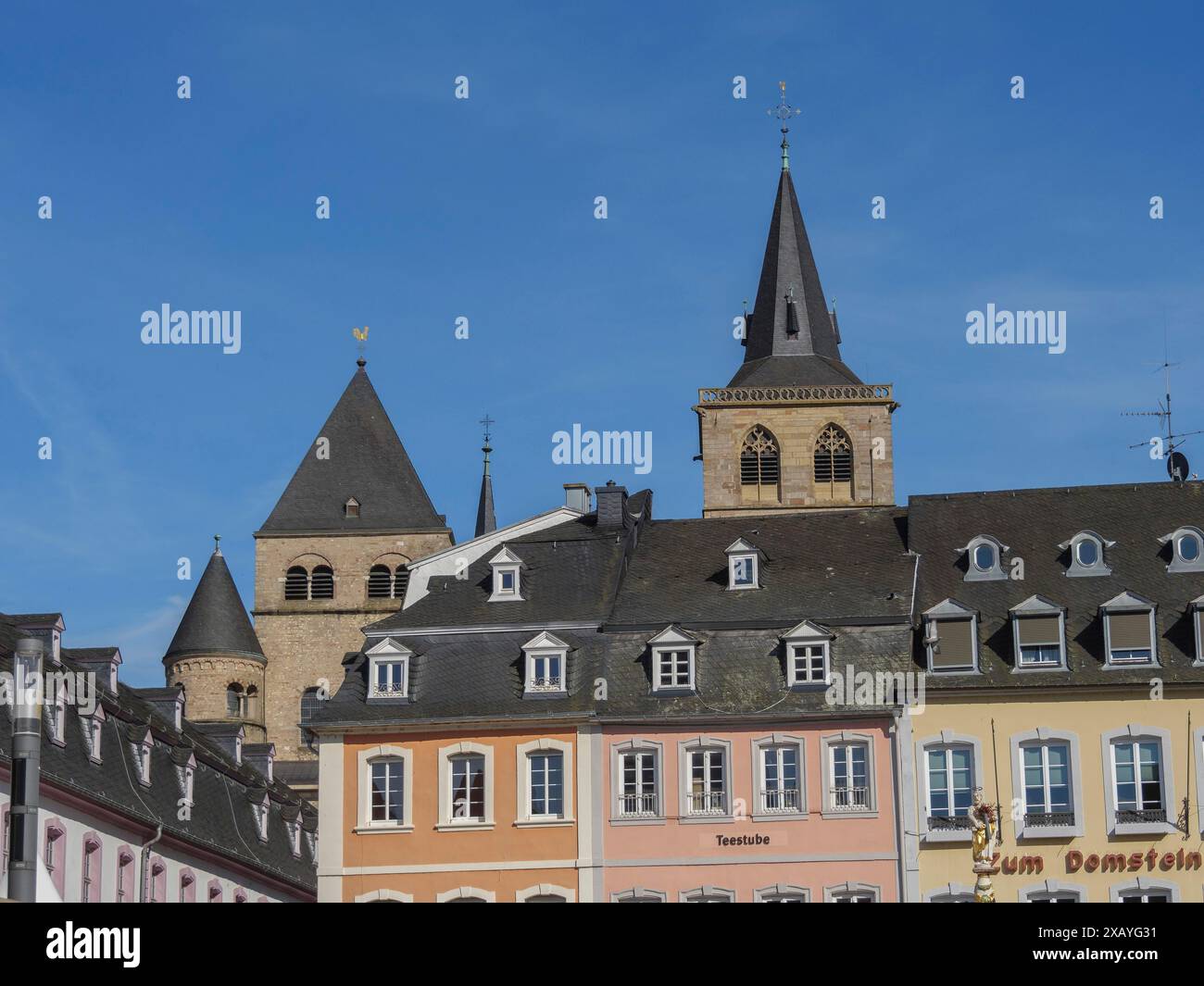 Colourful historic buildings and church tower in an old town under a ...