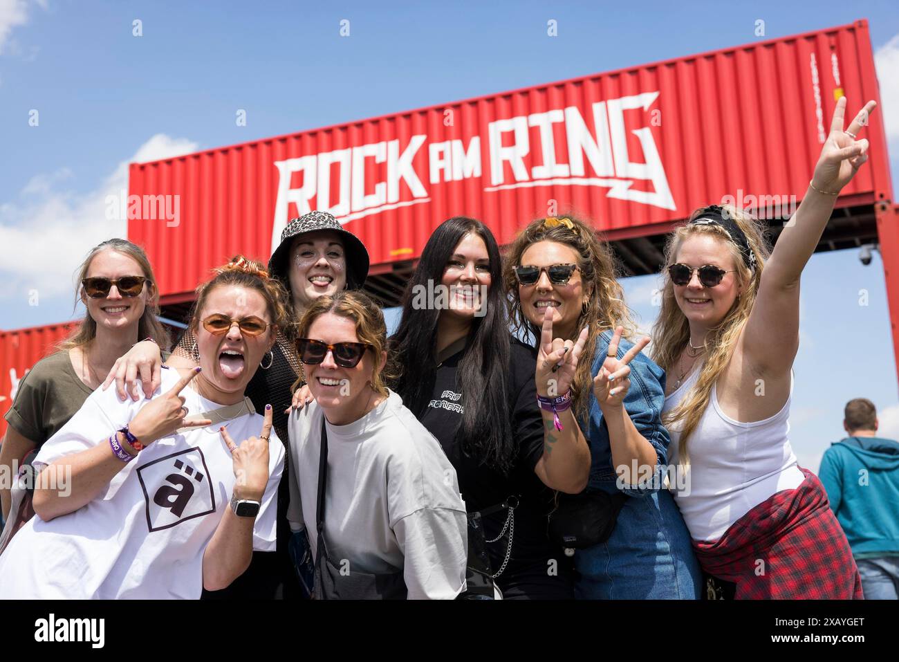 Festival visitor from Duisburg in front of the entrance to the infield ...