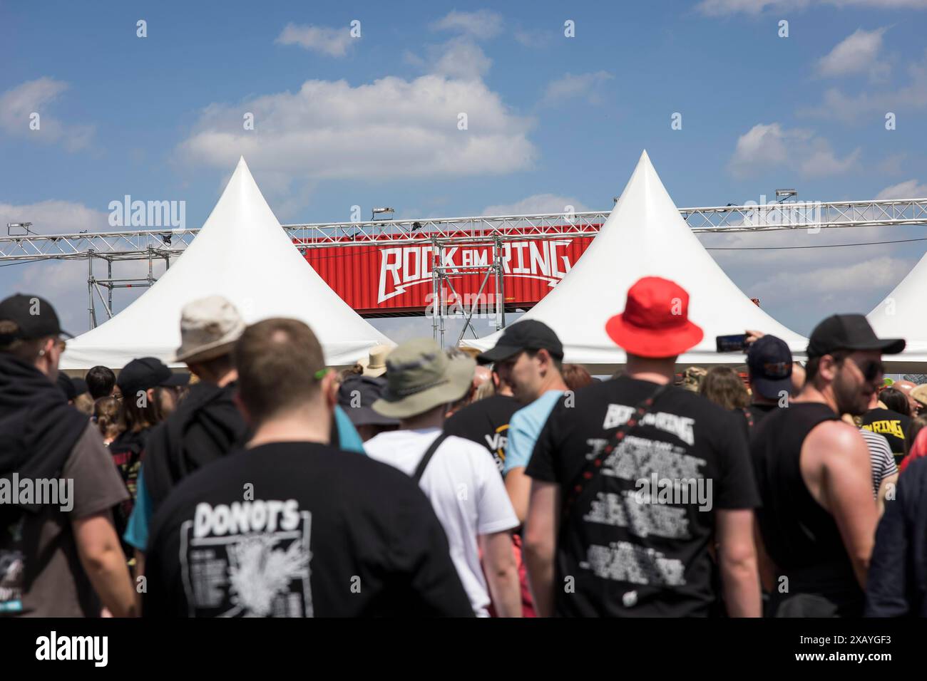 Festival visitors in front of the entrance to the infield at the Rock ...