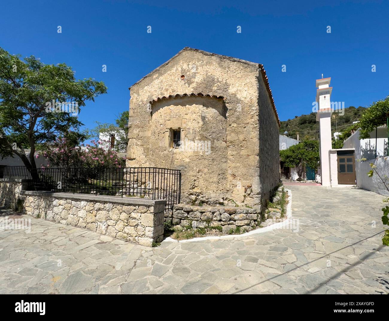 Exterior view from back with small apse of historic small single-nave church Panagia ...