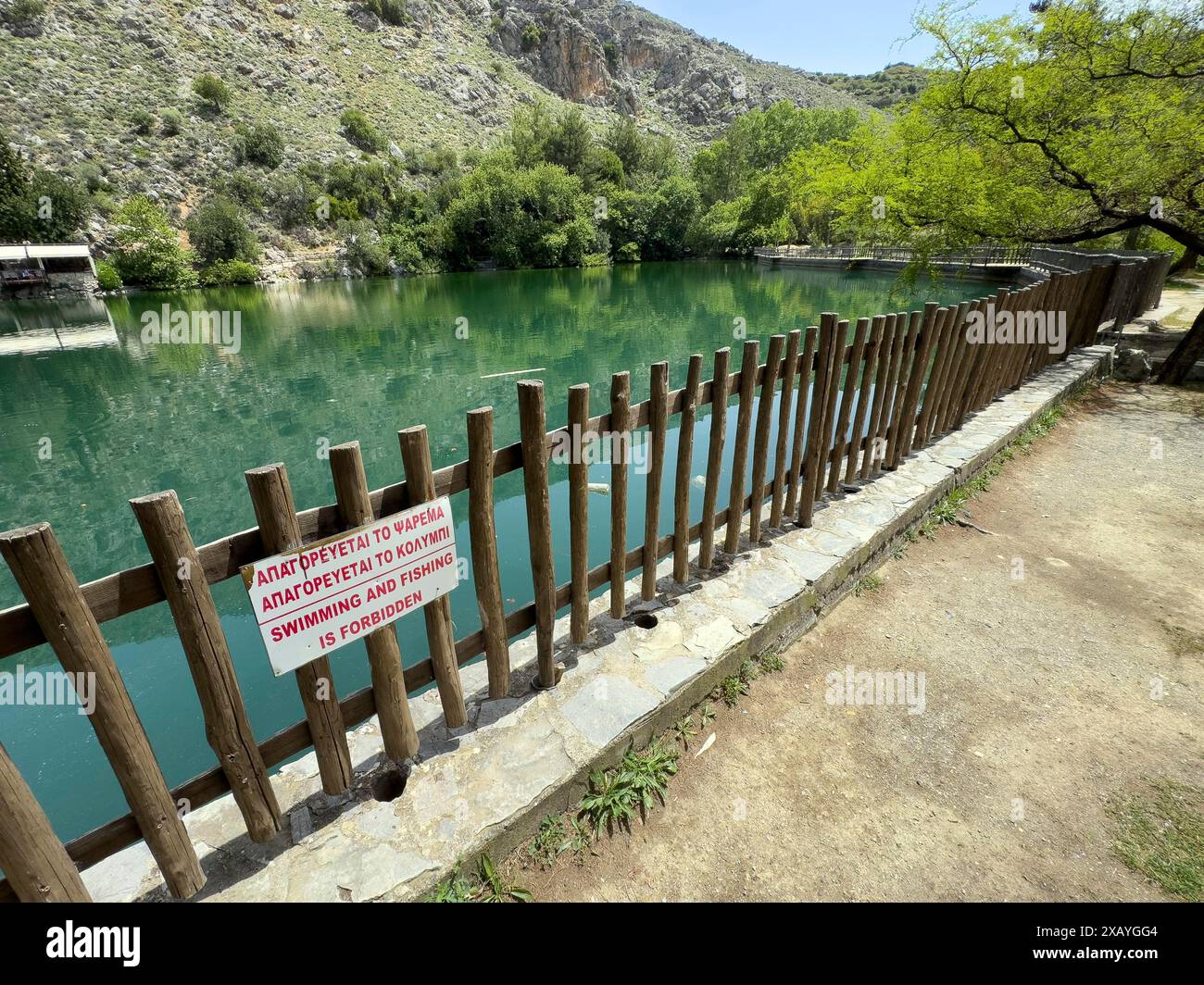 Prohibition sign in Greek and English swimming and fishing is forbidden ...