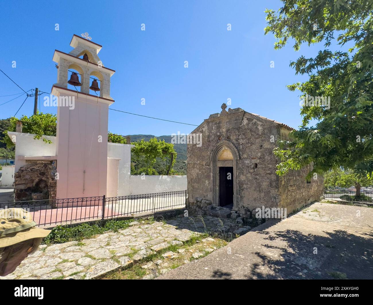 On the left, separate new bell tower on the right, historic small single-nave church of Panagia ...