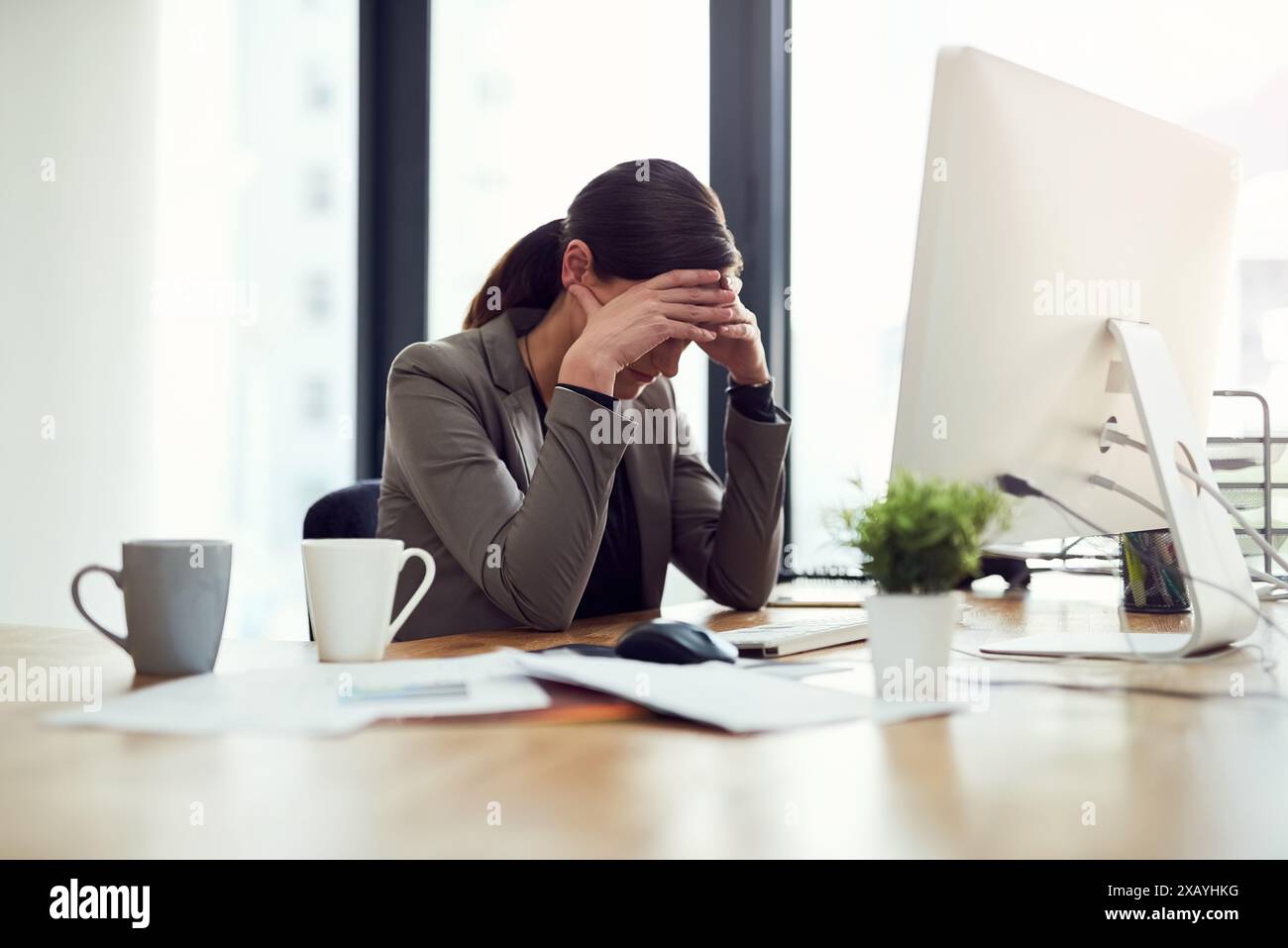 Woman, employee and stress on computer in office for internet or online ...