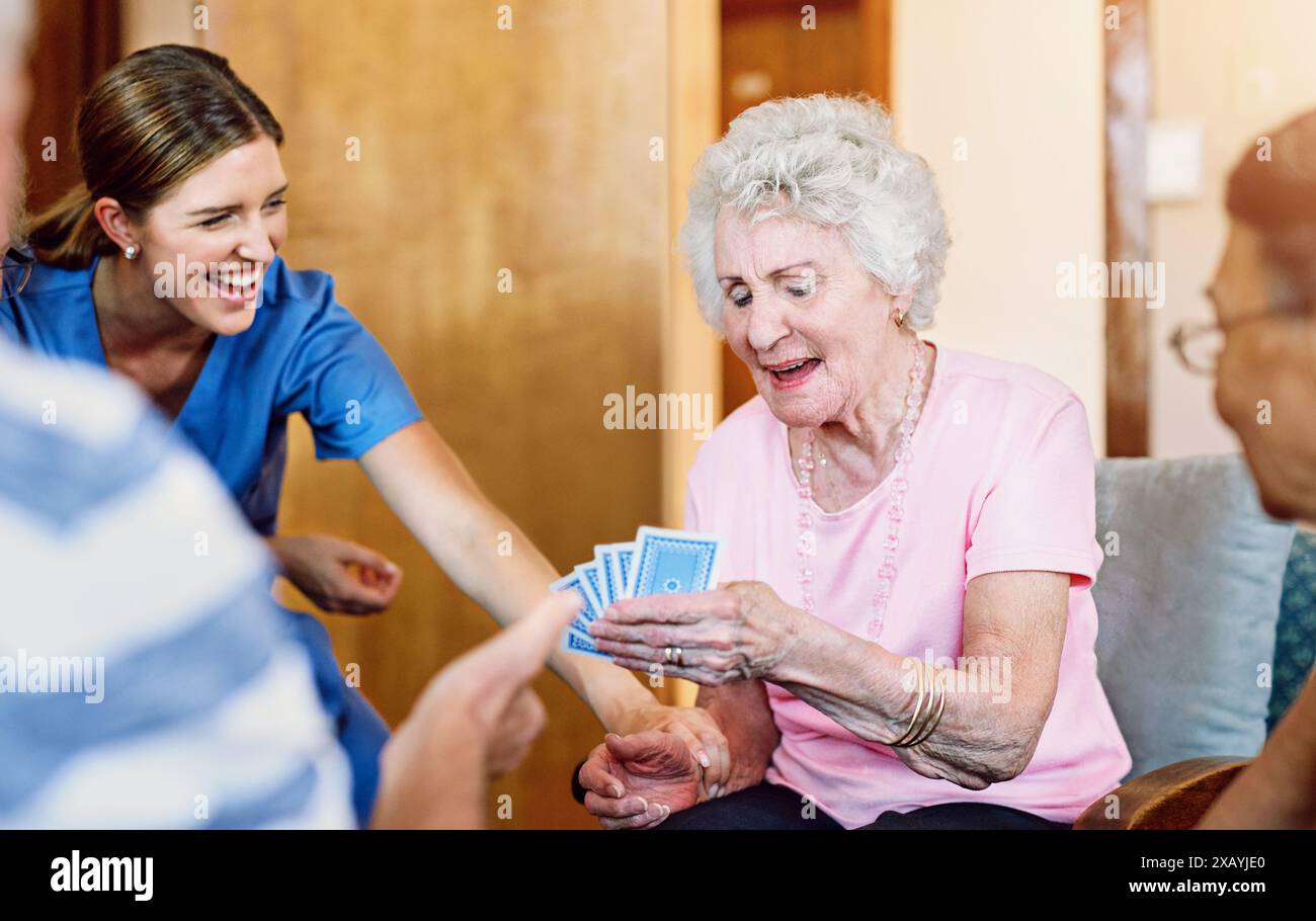 Women, nurse and senior patient with playing cards for games, fun and ...