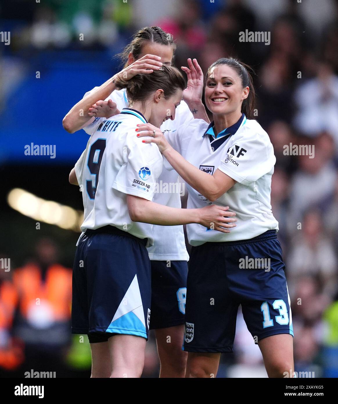 England's Ellen White (left) celebrates scoring their side's second ...