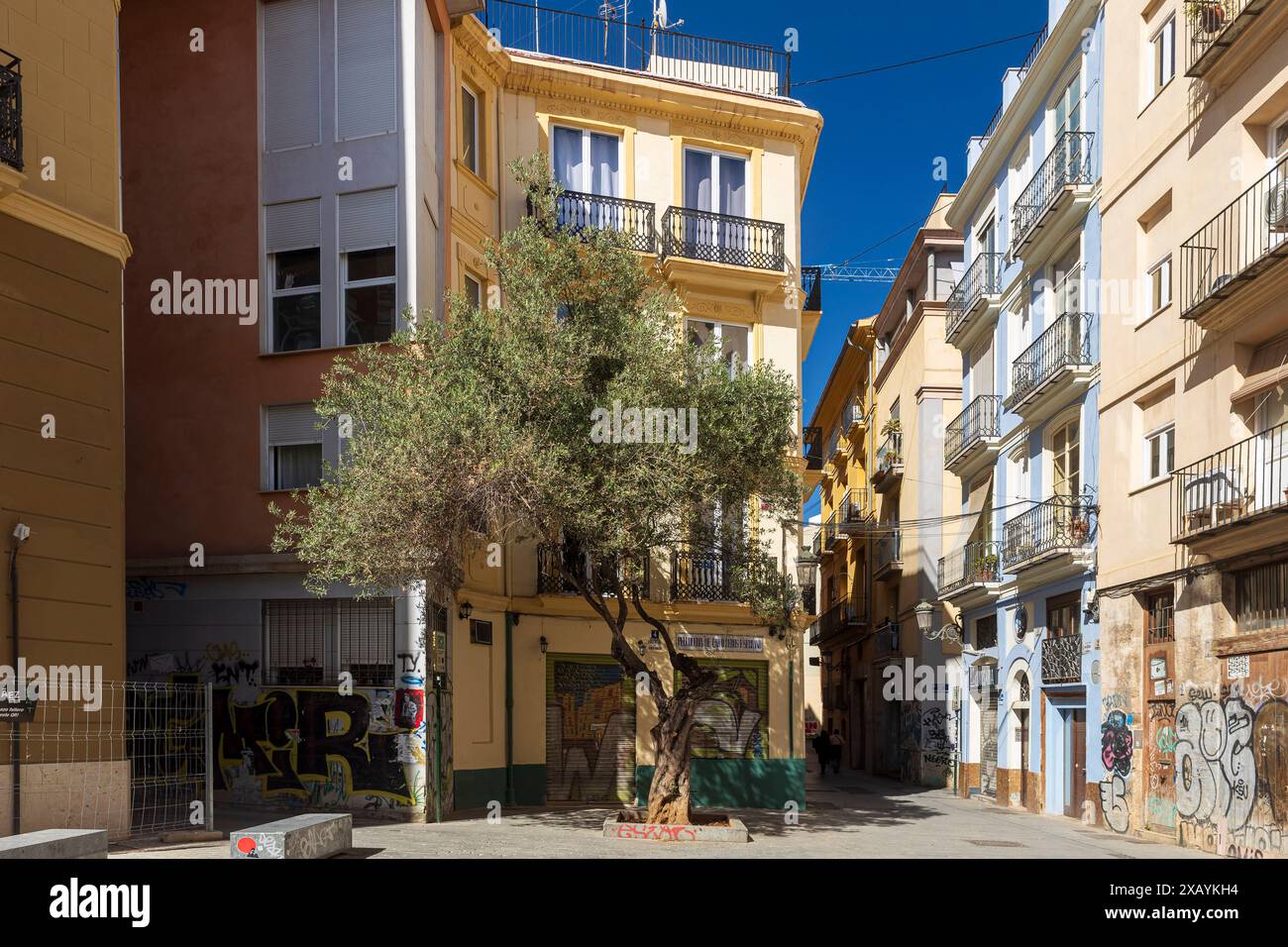 VALENCIA, SPAIN - May 2, 2024: Narrow streets with colorful houses in ...