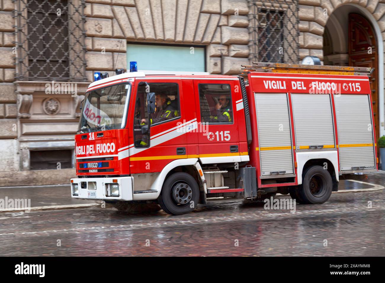 Rome, Italy - March 18 2018: Firefighters in their truck departing from ...