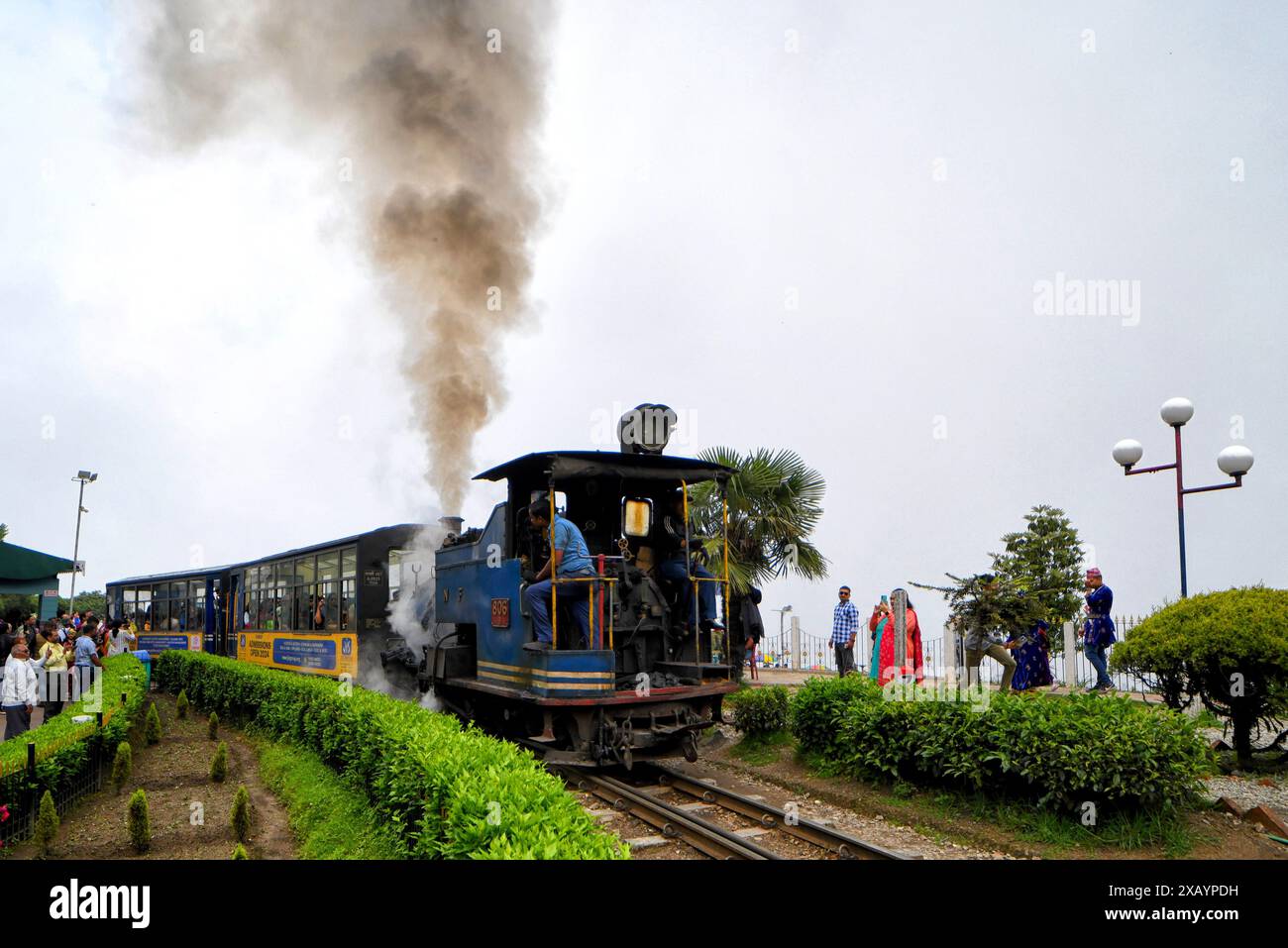 A Toy Train makes its journey along Batasia Loop. The Darjeeling ...