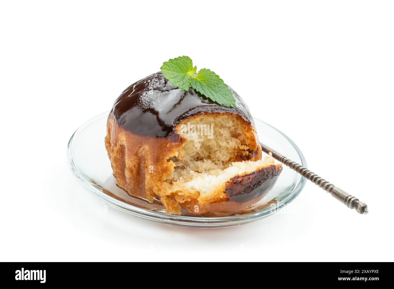 Rum baba decorated with dark chocolate isolated on white Stock Photo ...