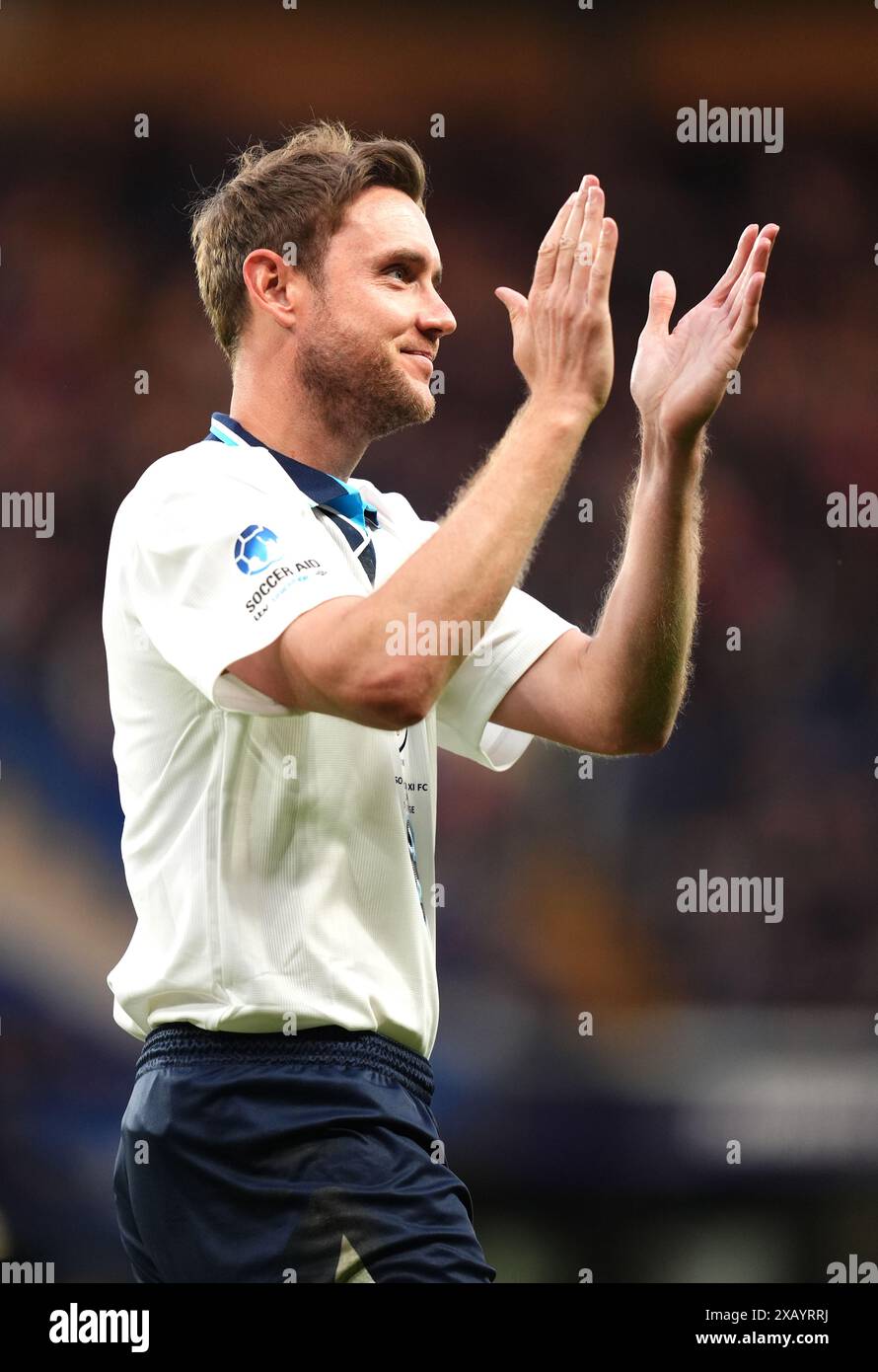 England's Stuart Broad applauds the fans before the second half during ...