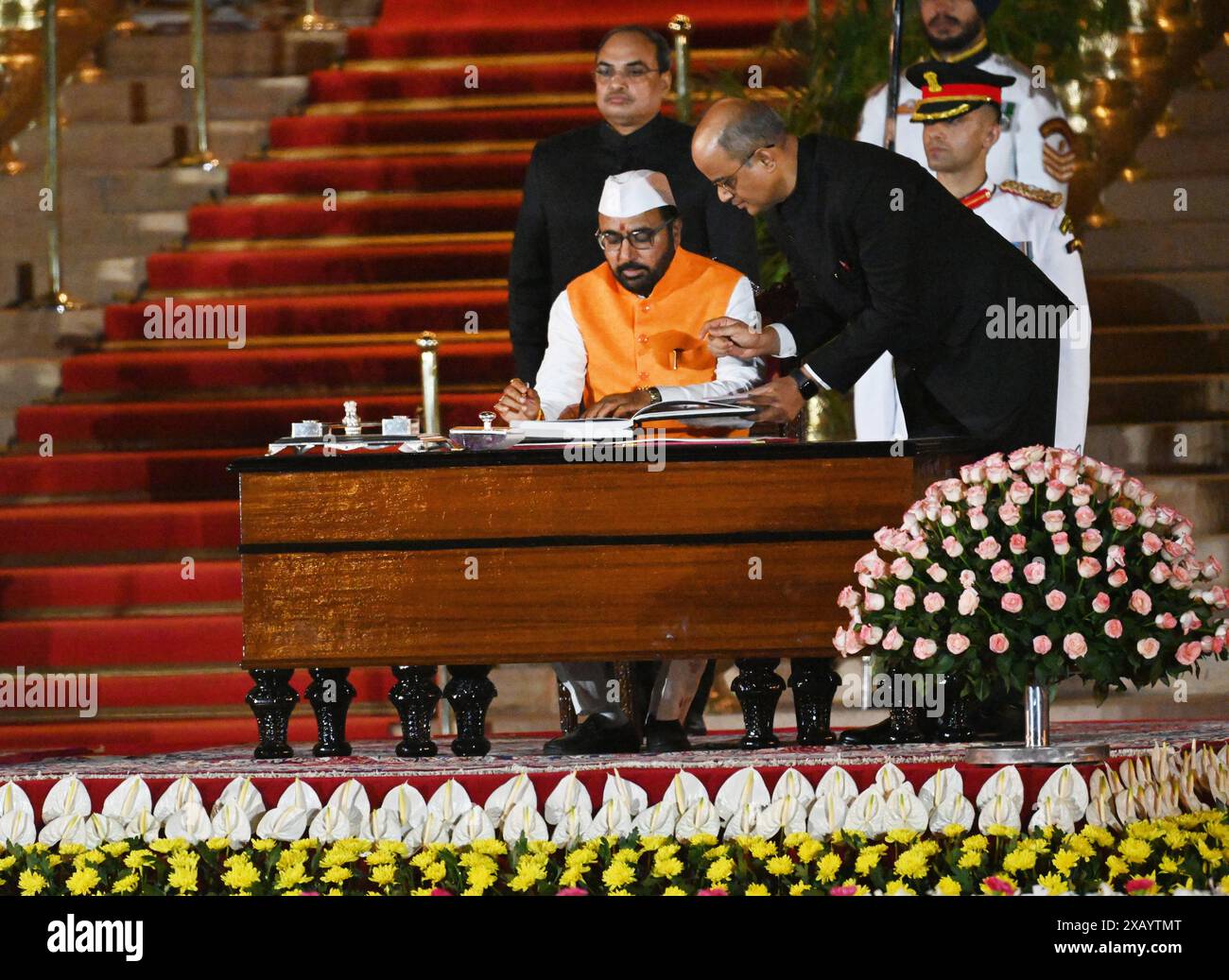 NEW DELHI, INDIA - JUNE 9: Shiv Sena leader Pratap Rao Jadhav signs the ...