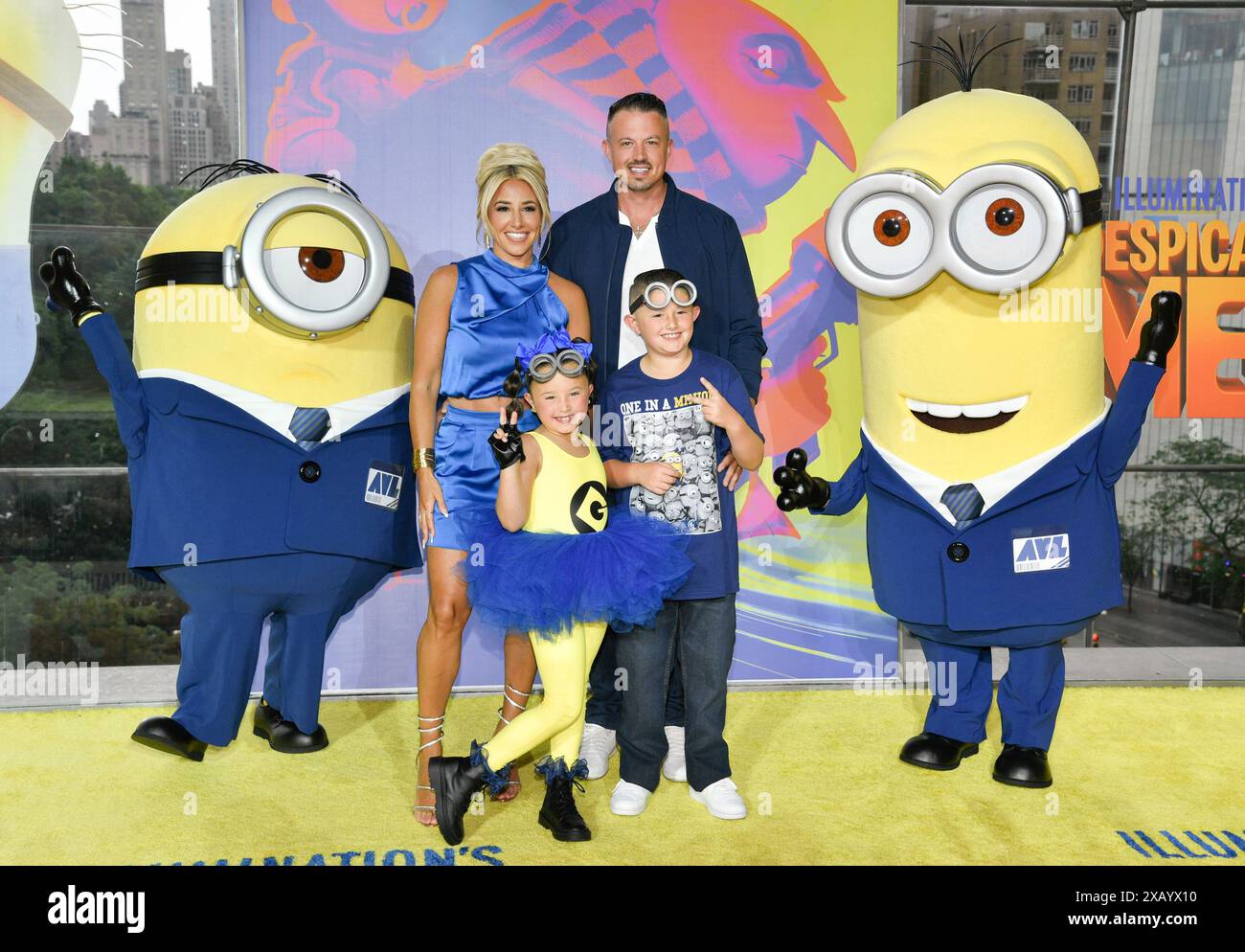 Danielle Cabral, left, and husband Nate Cabral pose with their children ...