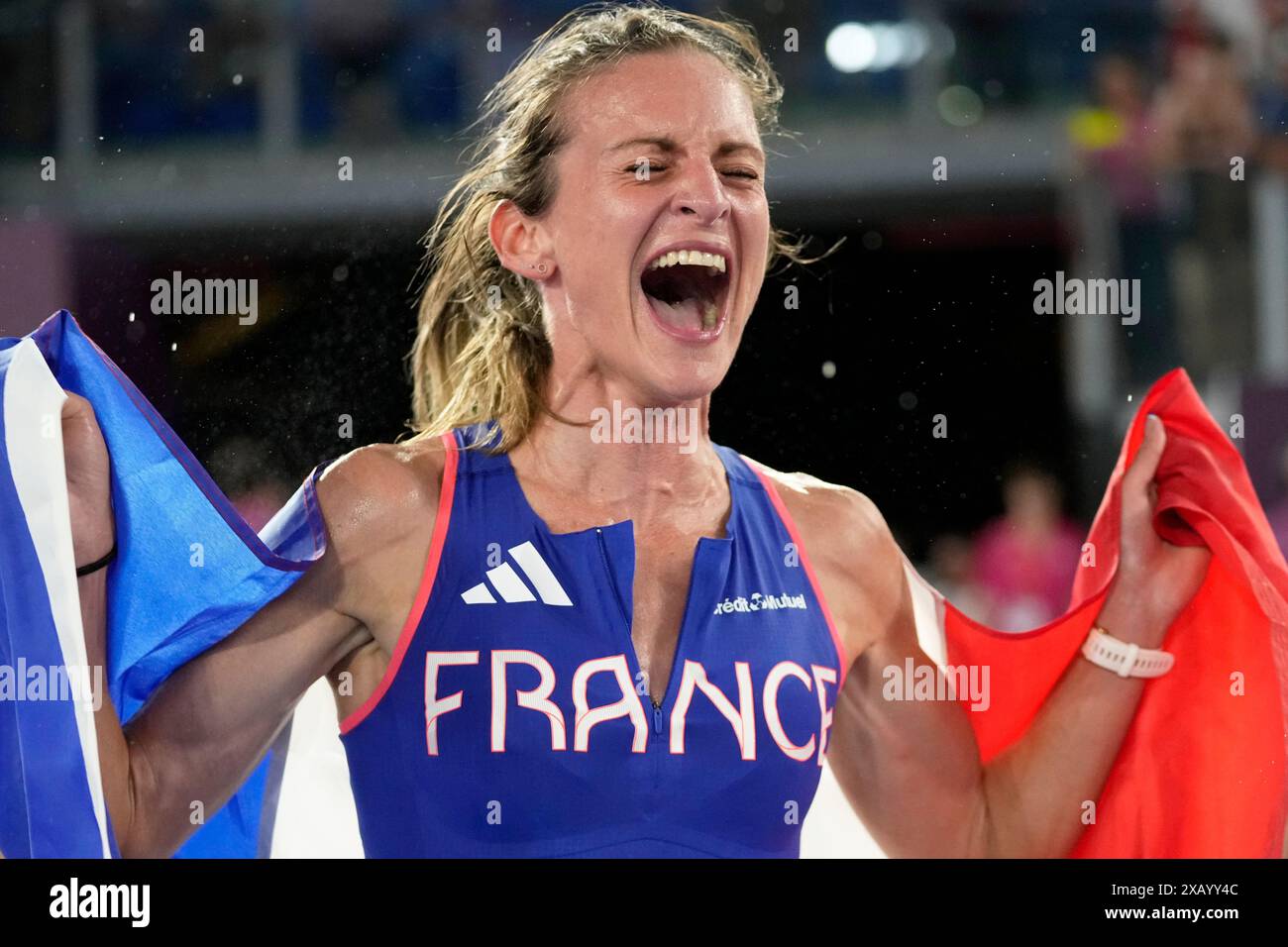 Alice Finot, of France, celebrates after winning the gold medal in the ...