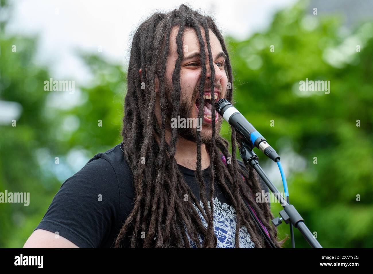 A close-up of lead singer Kane Two Feathers of Mother Fungus, a Boston ...