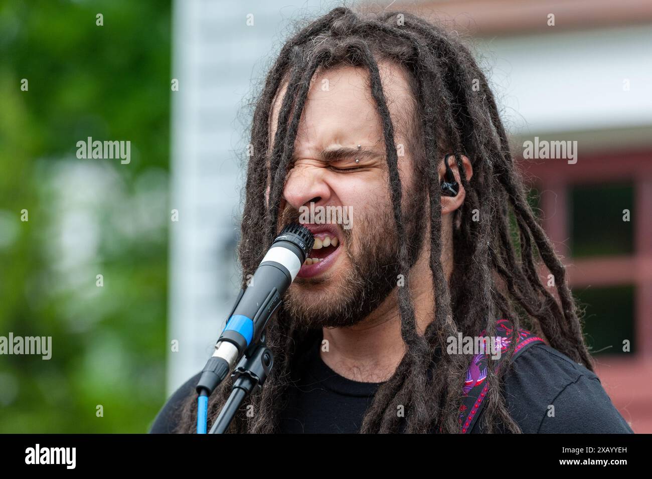 A close-up of lead singer Kane Two Feathers of Mother Fungus, a Boston ...