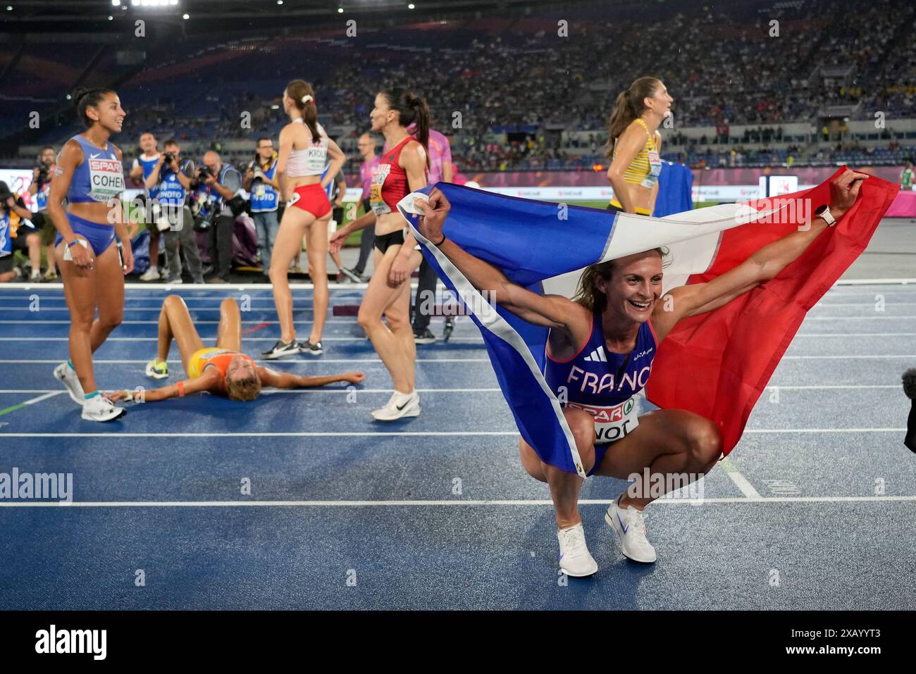 Alice Finot, of France celebrates after winning the gold medal in the ...