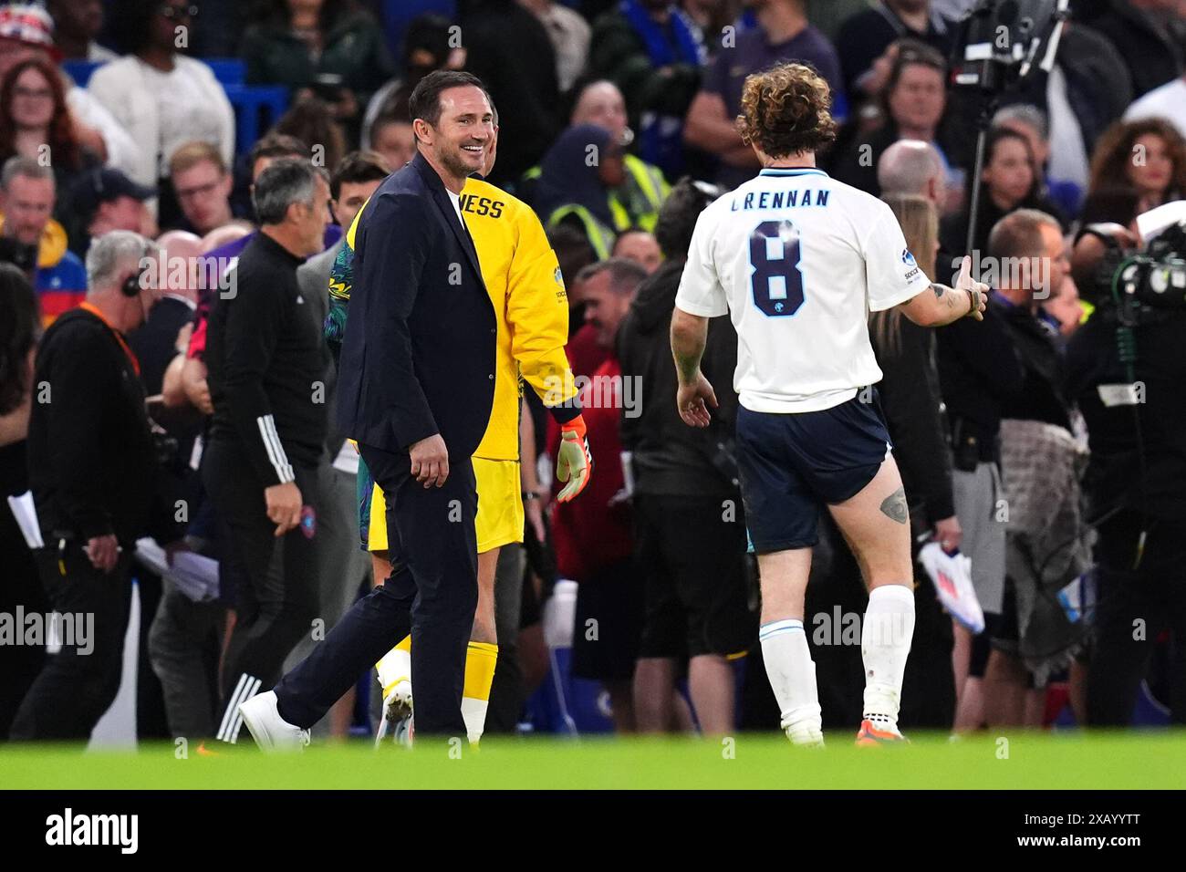 England coach Frank Lampard and player Tom Grennan (right) during ...
