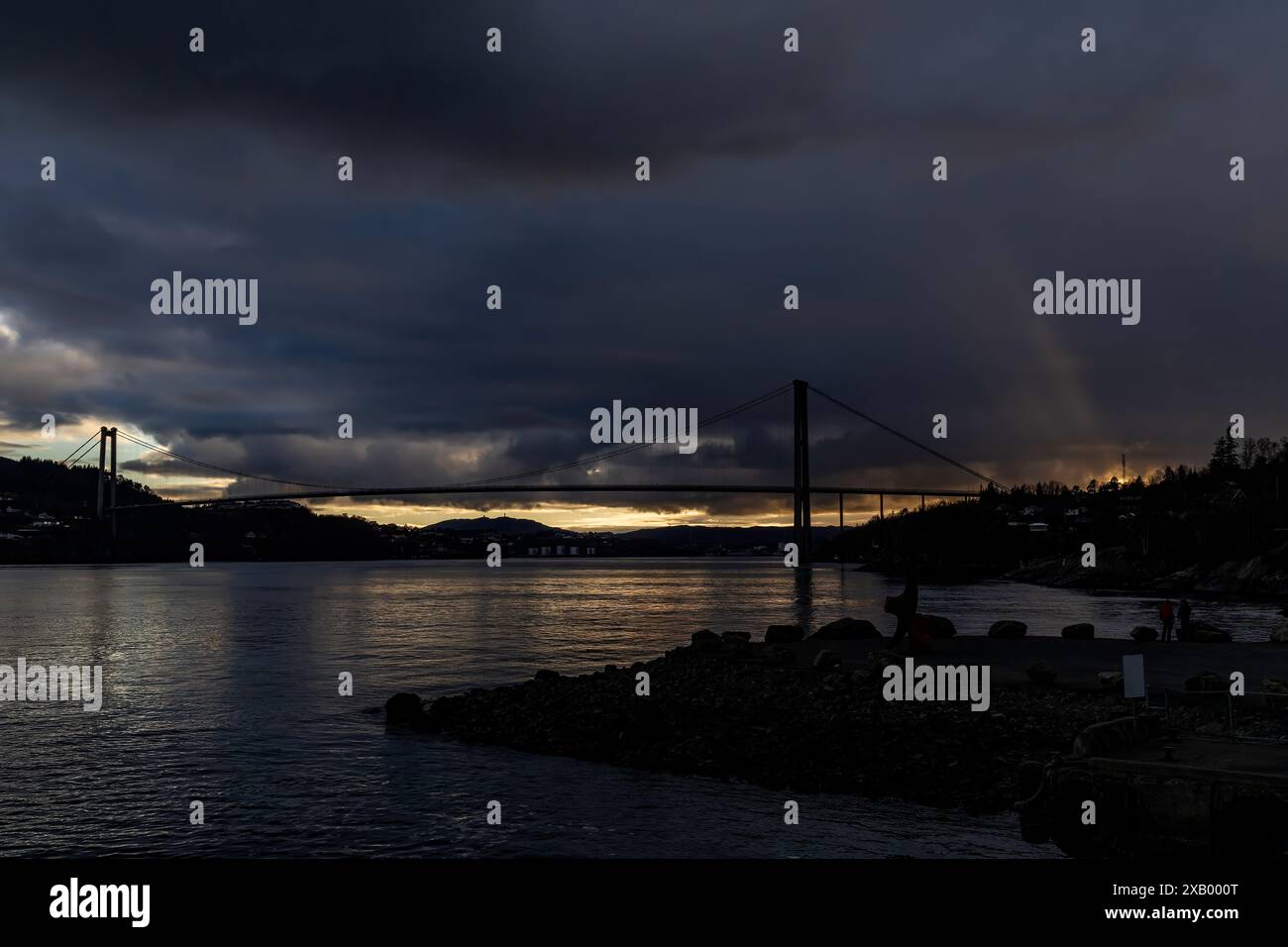 Sunset at Askoey (Askøy) suspension bridge outside port of Bergen ...