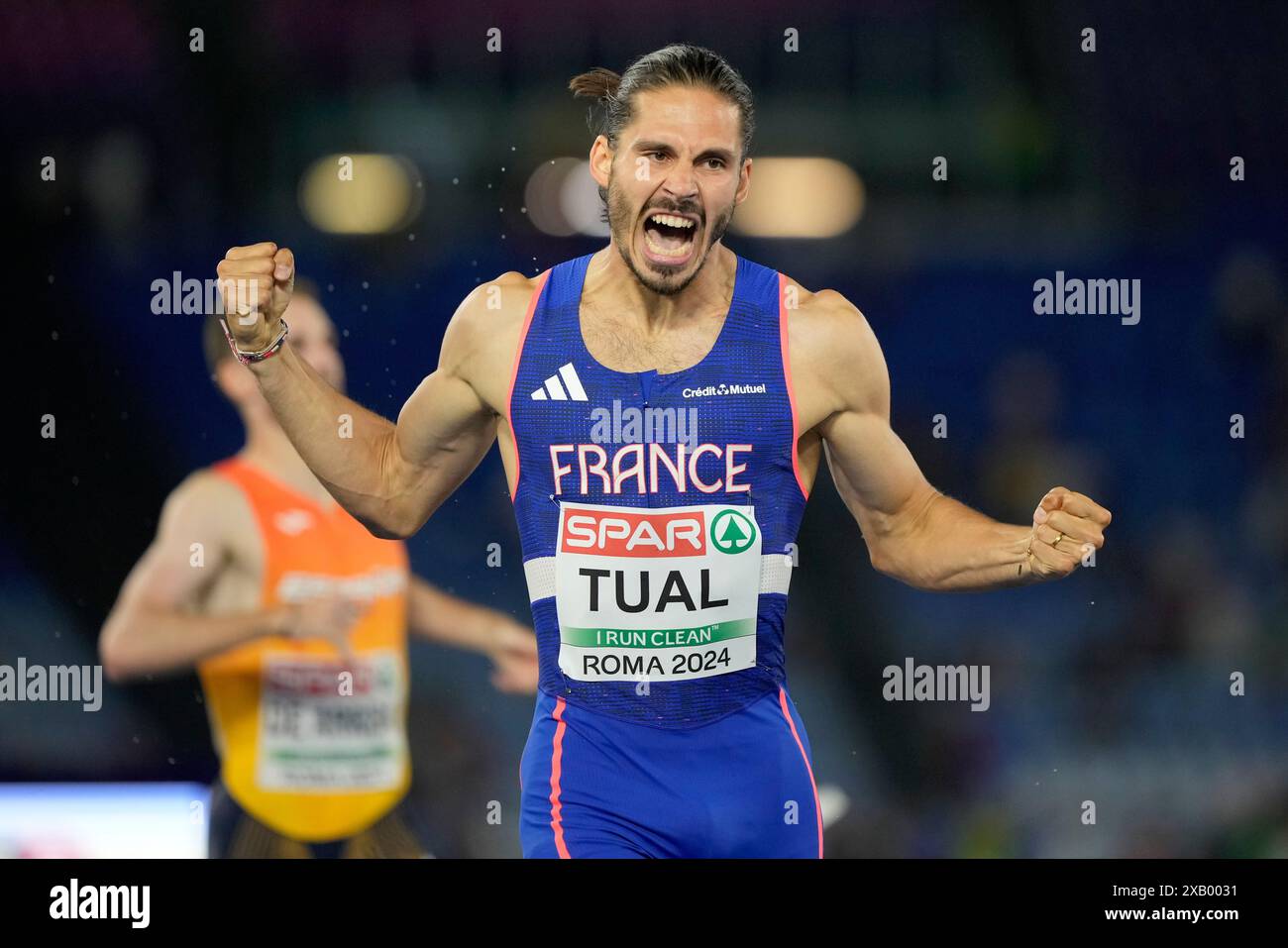 Gabriel Tual, of France celebrates after winning the gold medal in the ...