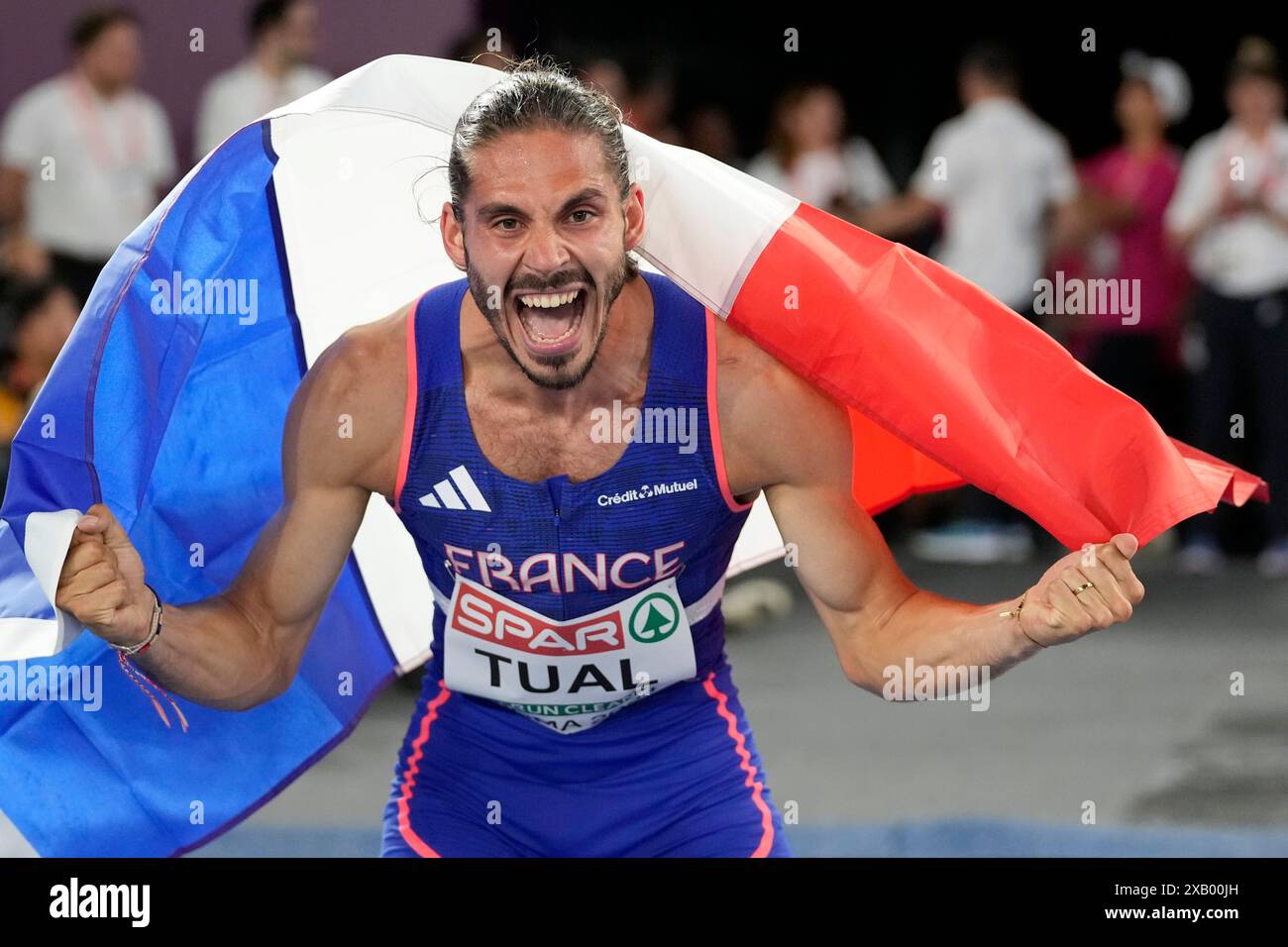 Gabriel Tual, of France, celebrates after winning the gold medal in the ...