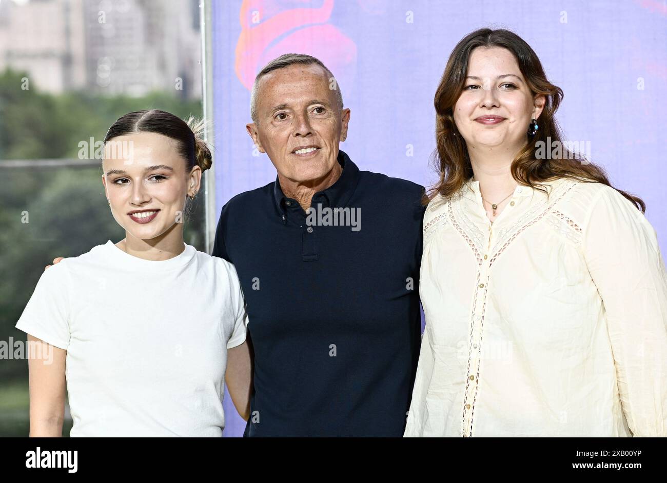 Singer Curt Smith from the band Tears For Fears, center, poses with his daughters Diva Smith ...