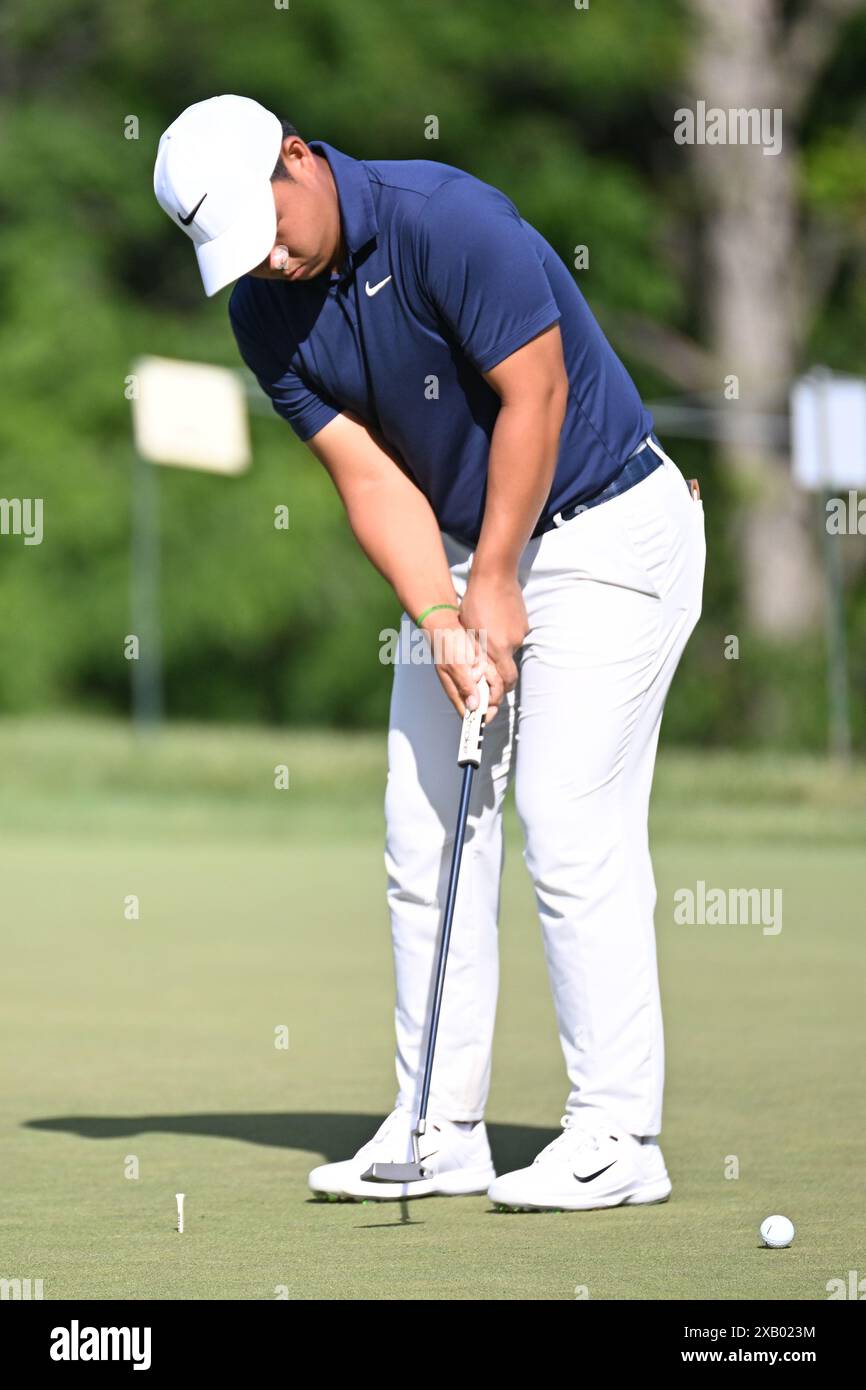 Dublin, Ohio, USA. 9th June, 2024. Tom Kim (KOR) putts on the putting ...