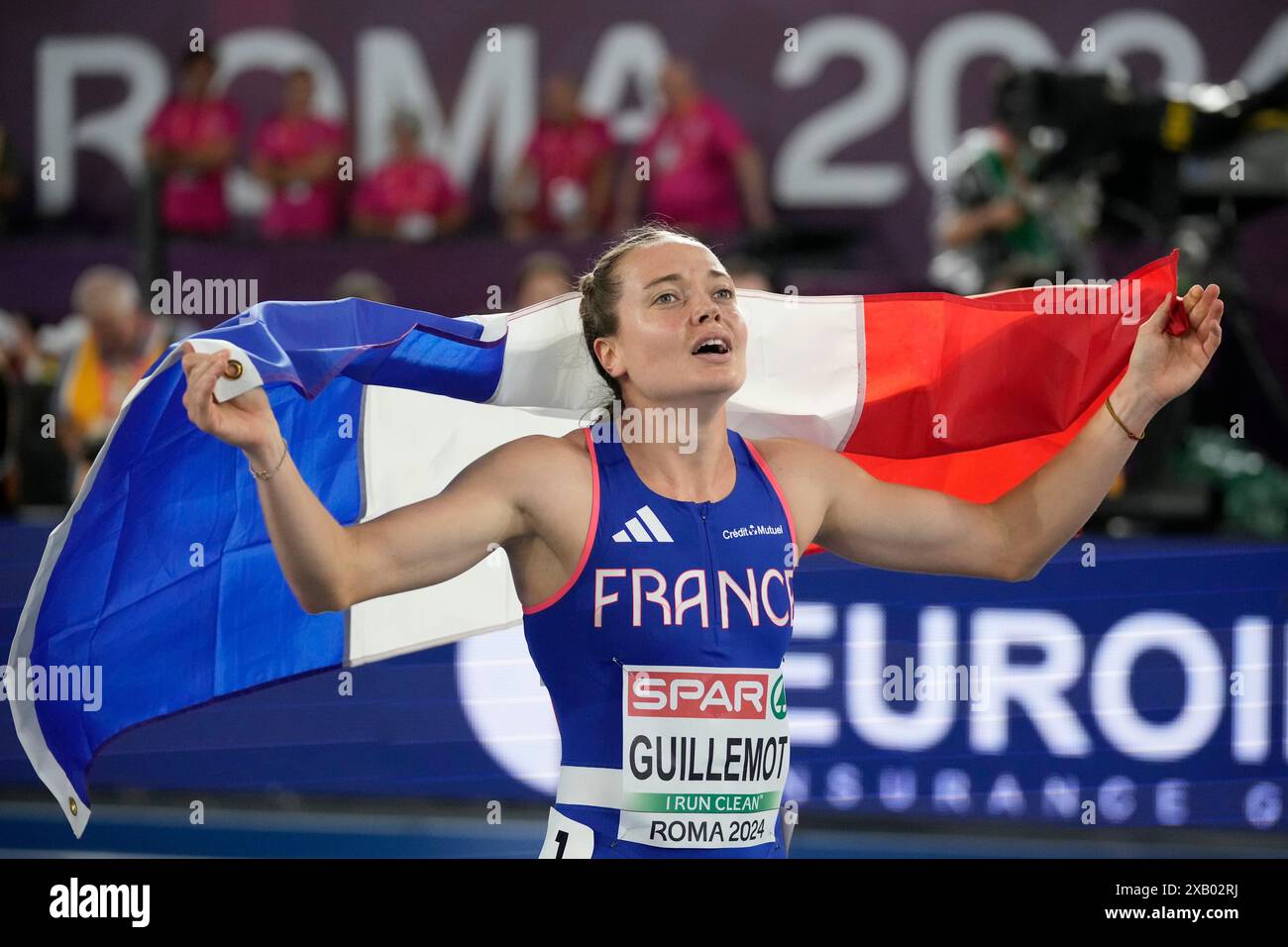 Agathe Guillemot, of France, celebrates after winning the bronze medal ...