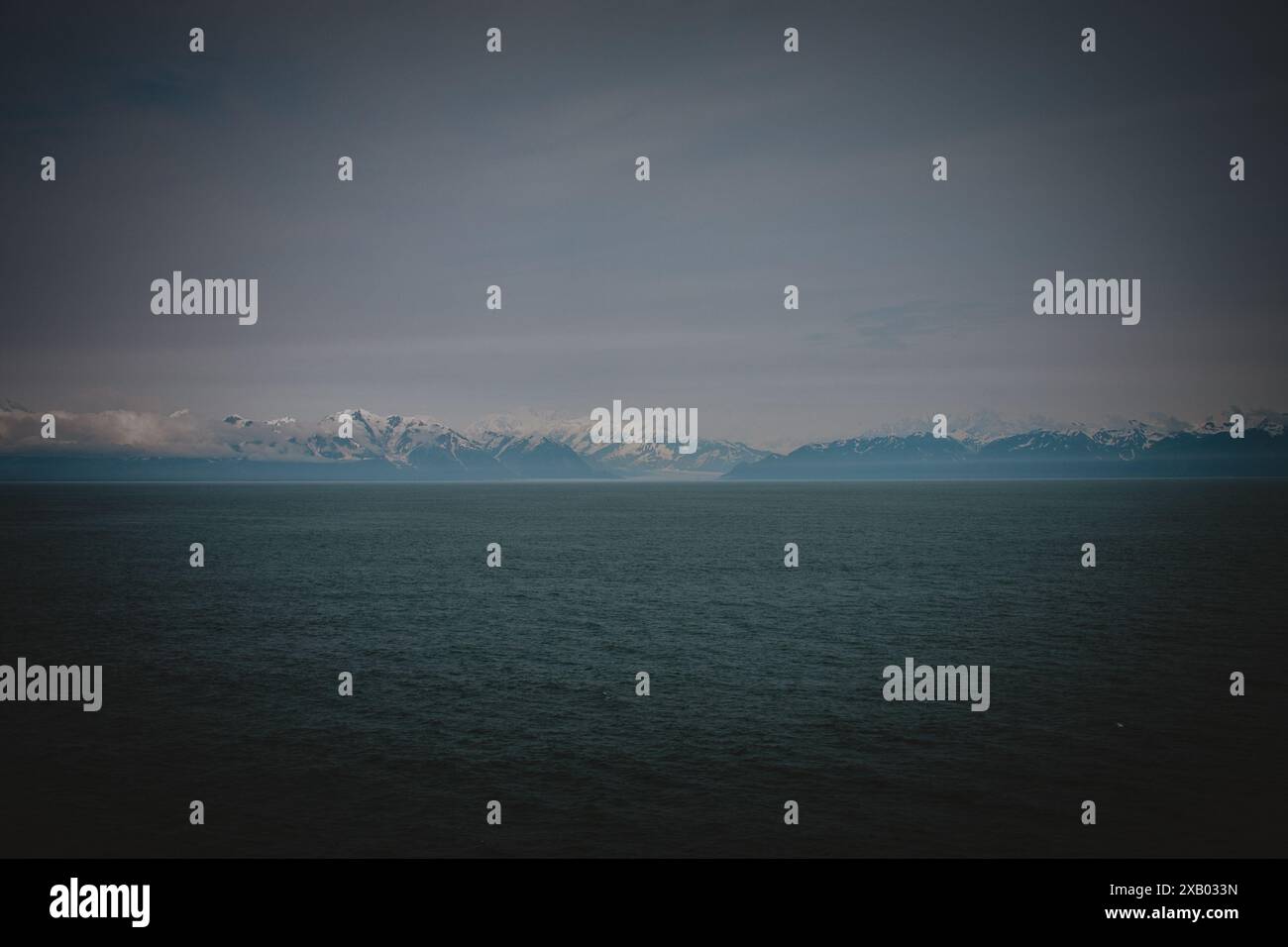 A breathtaking panorama of the Alaskan mountain range with snow-capped ...