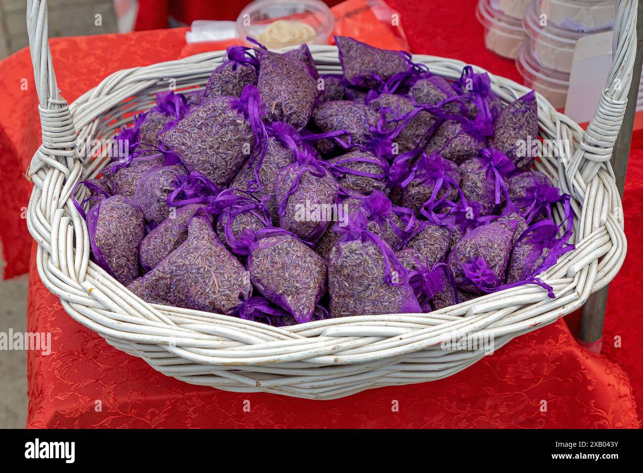 Lavender in purple bags pile sold on a market Stock Photo - Alamy
