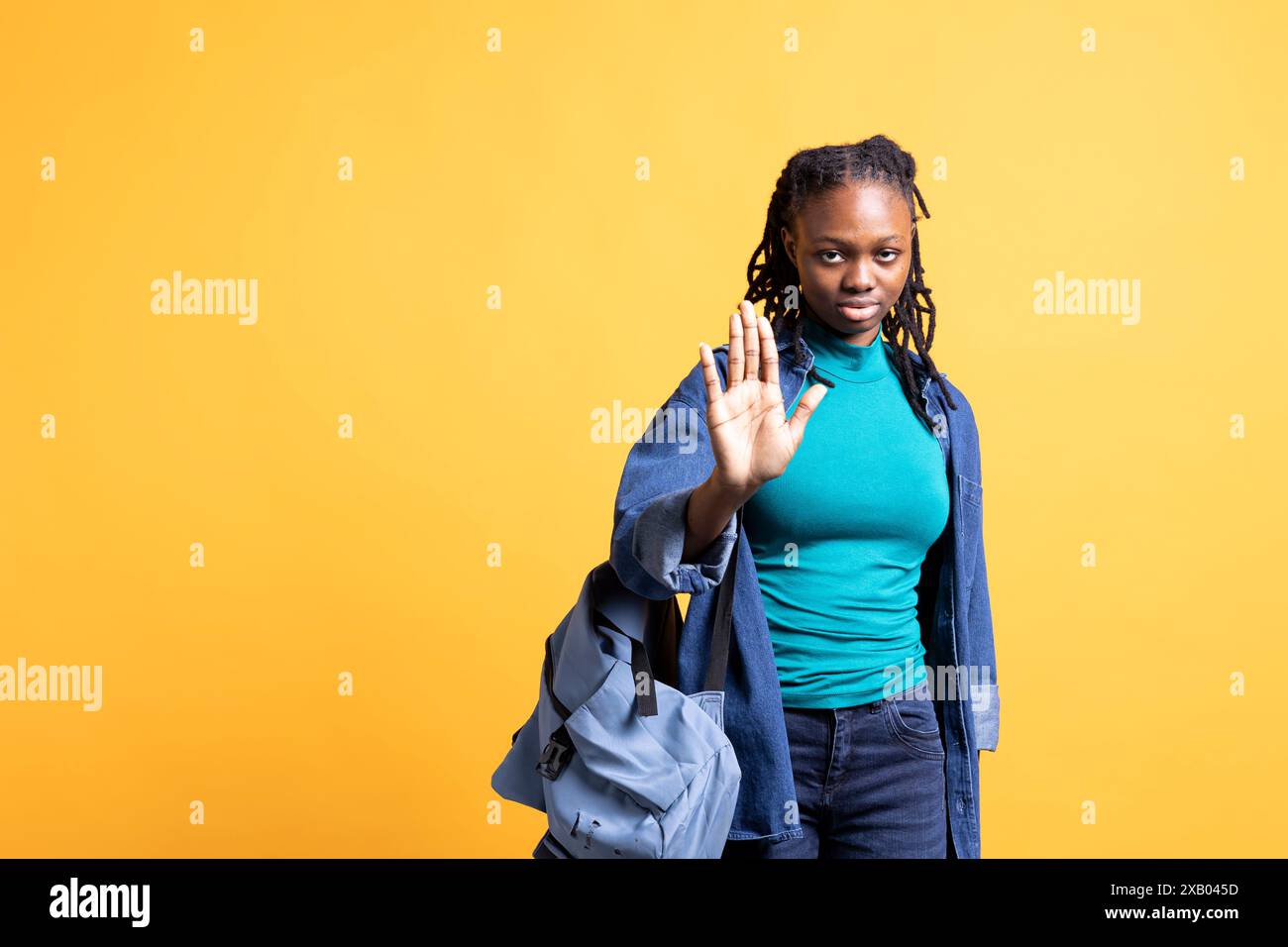 Assertive african american woman doing stop hand gesture. Annoyed BIPOC ...