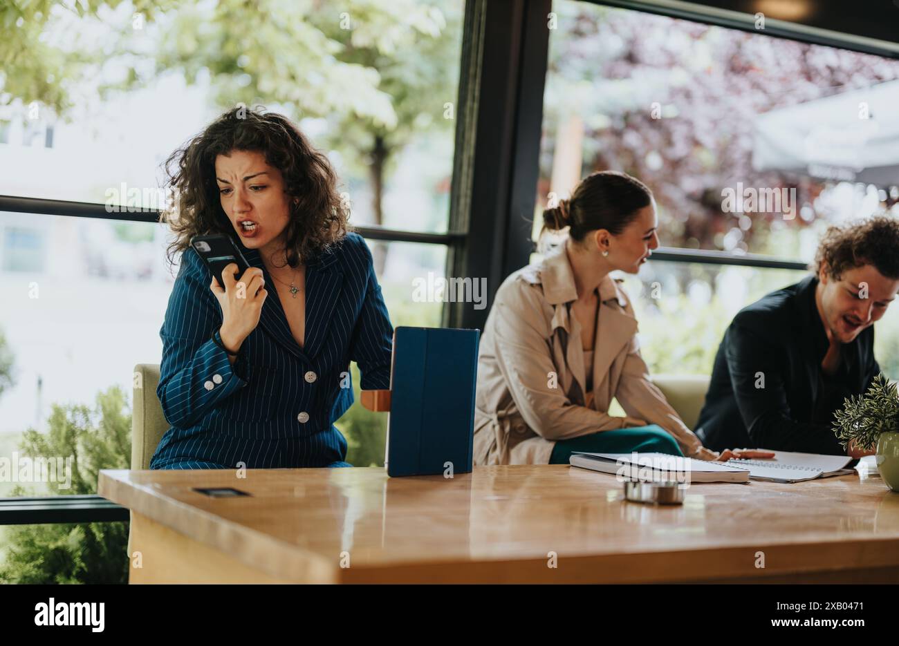 Business colleagues having a misunderstanding and arguing during a ...