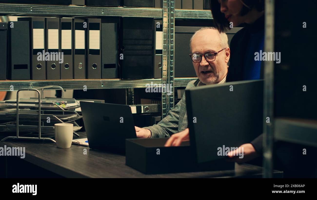 Forensic team examining classified documents and medical records ...