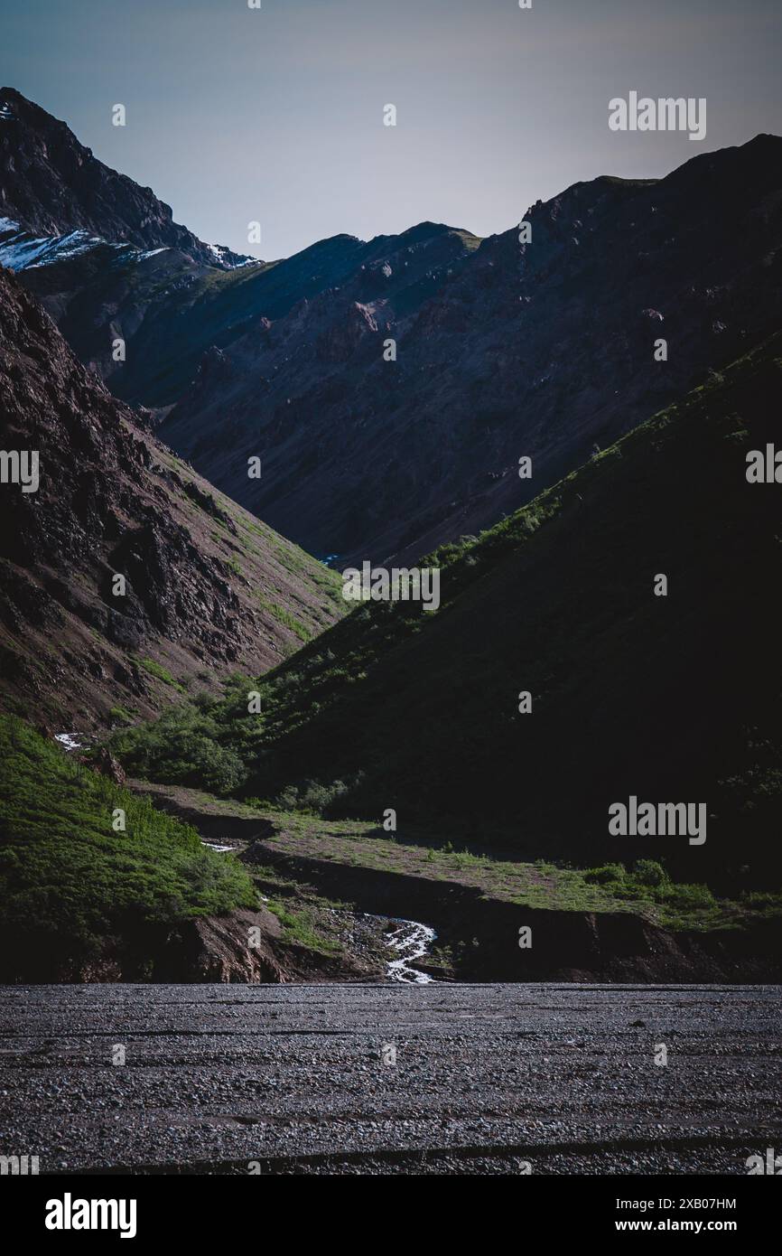 Explore the mysterious beauty of Alaska's shadowed valleys, where ...