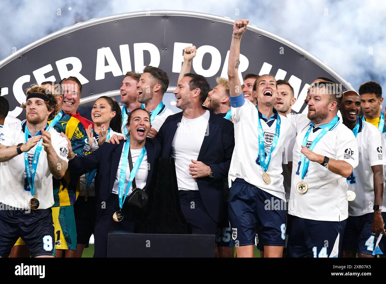 England coach Frank Lampard (centre) and players celebrate following ...