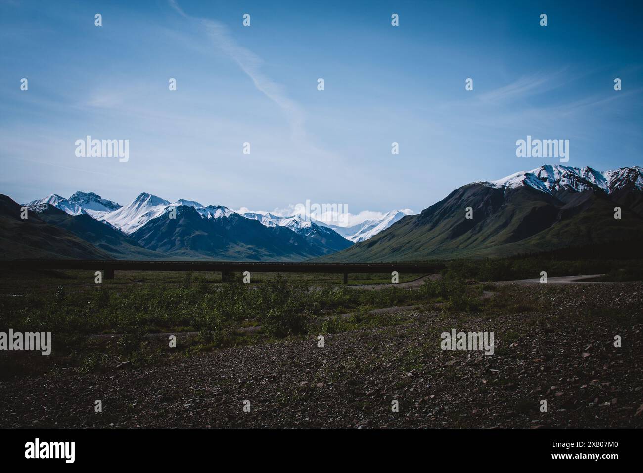 Experience the grandeur of Alaska's mountain ranges under a clear ...