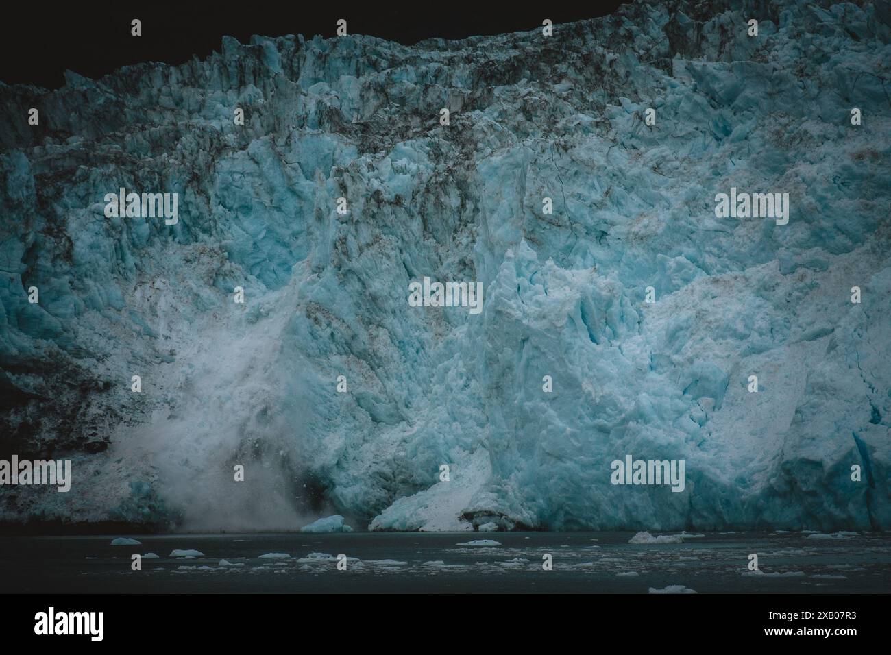 Witness the breathtaking moment of a glacier calving in Alaska. This ...