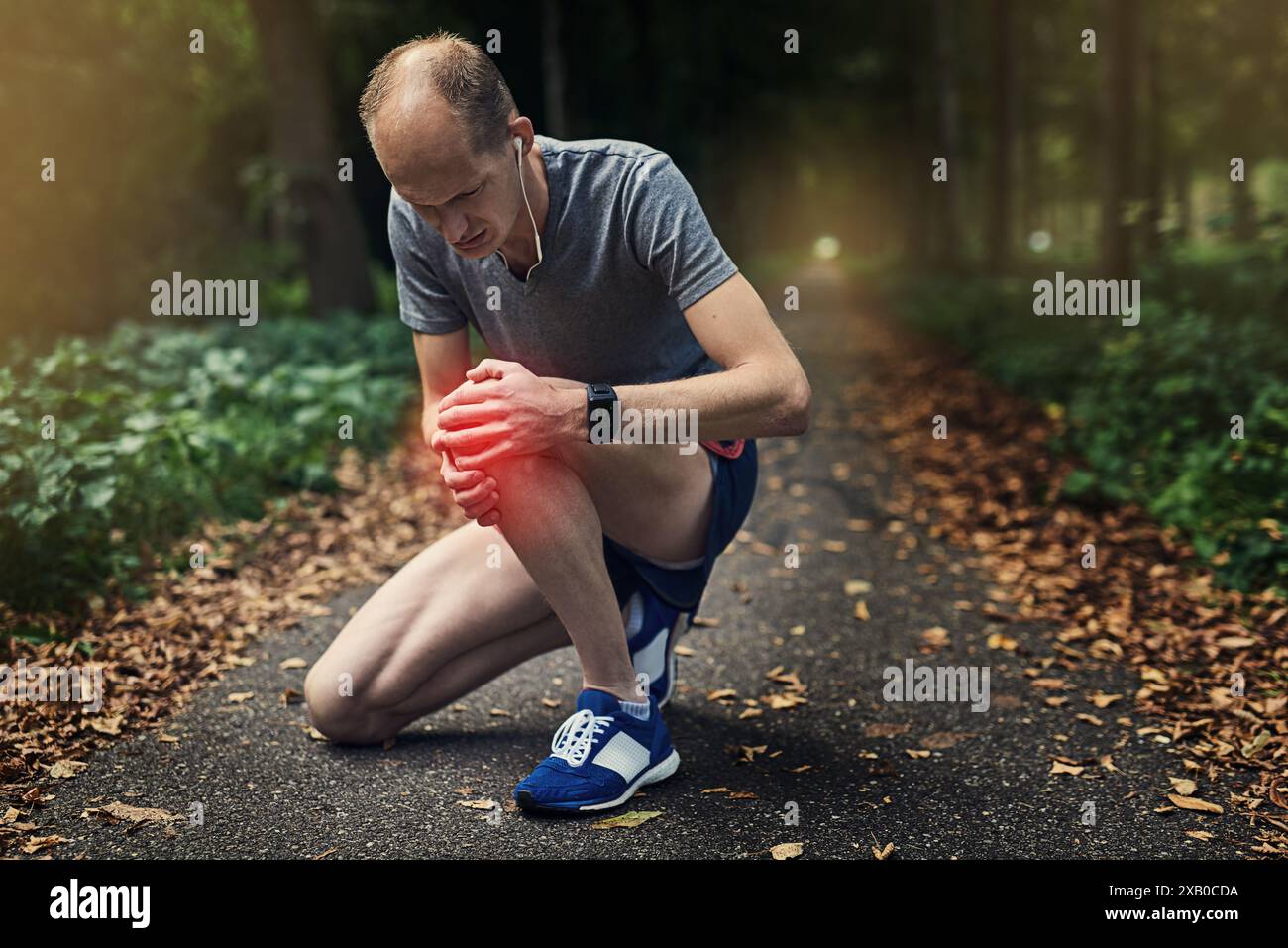 Knee pain, jog and man in nature for exercise, rest and check injury on ...