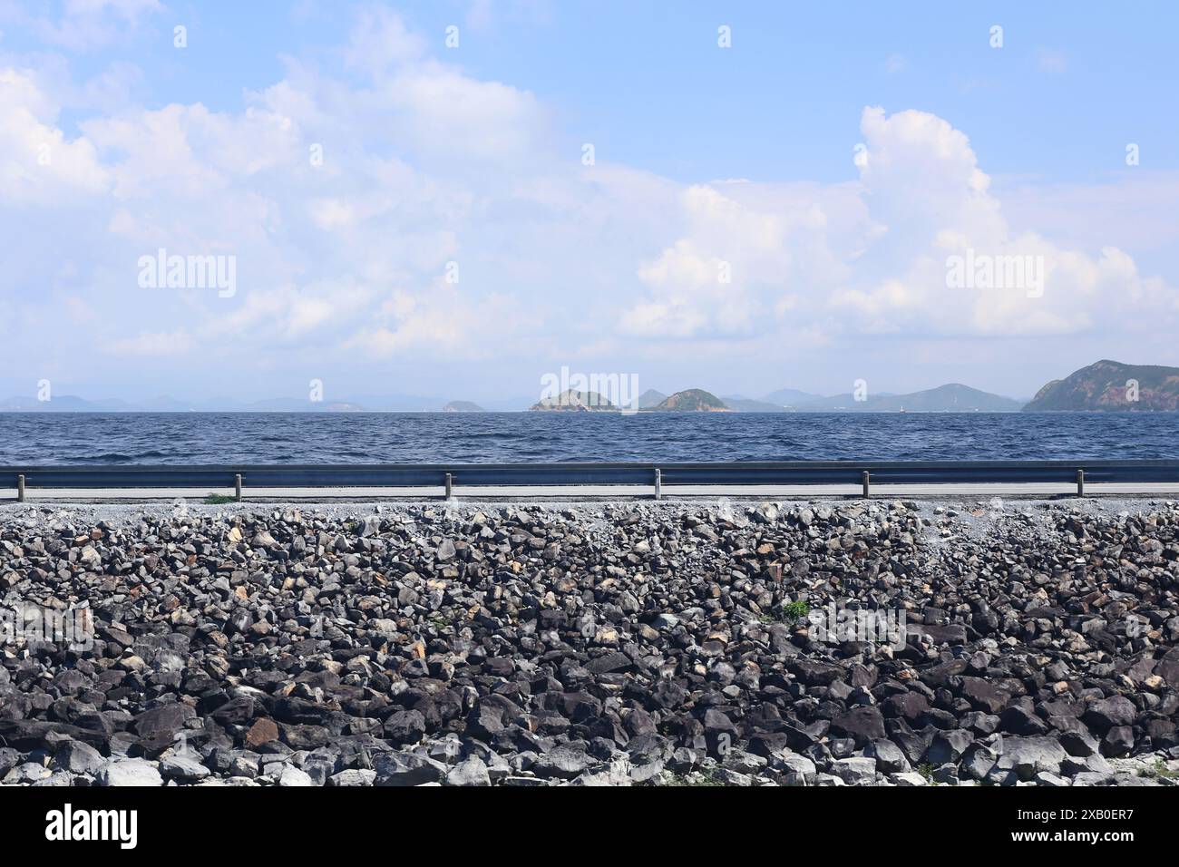 Dam ridge of breakwater barrier sea view in middle of the day the ...
