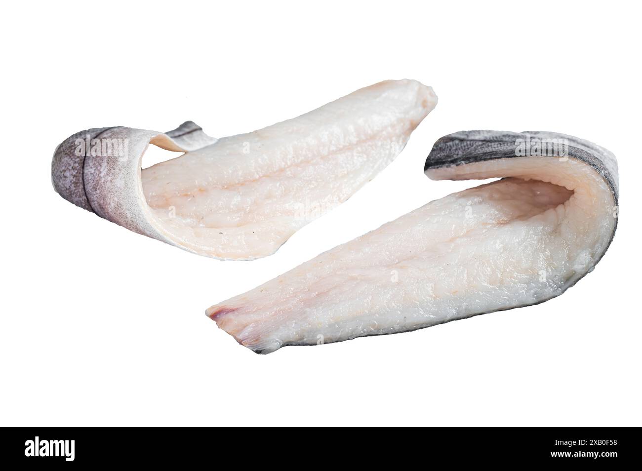 Two raw haddock fish fillets on kitchen table. Isolated on white ...
